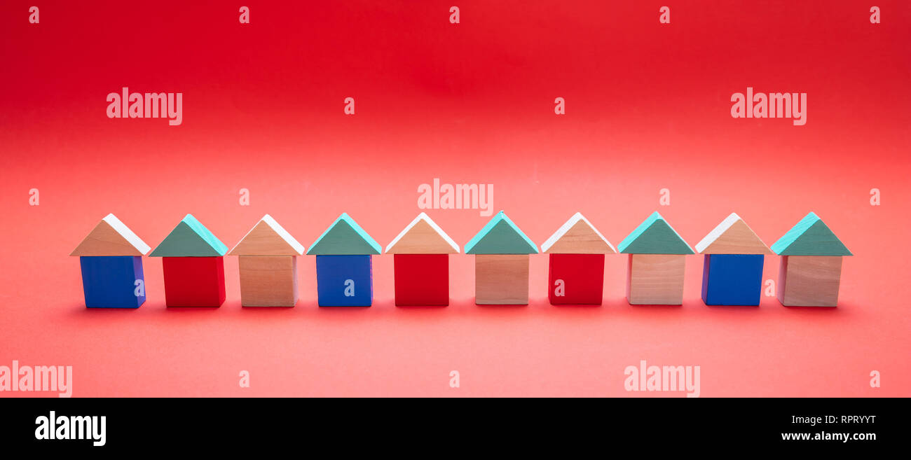 Real estate and village concept, Small wooden blocks house models with ...