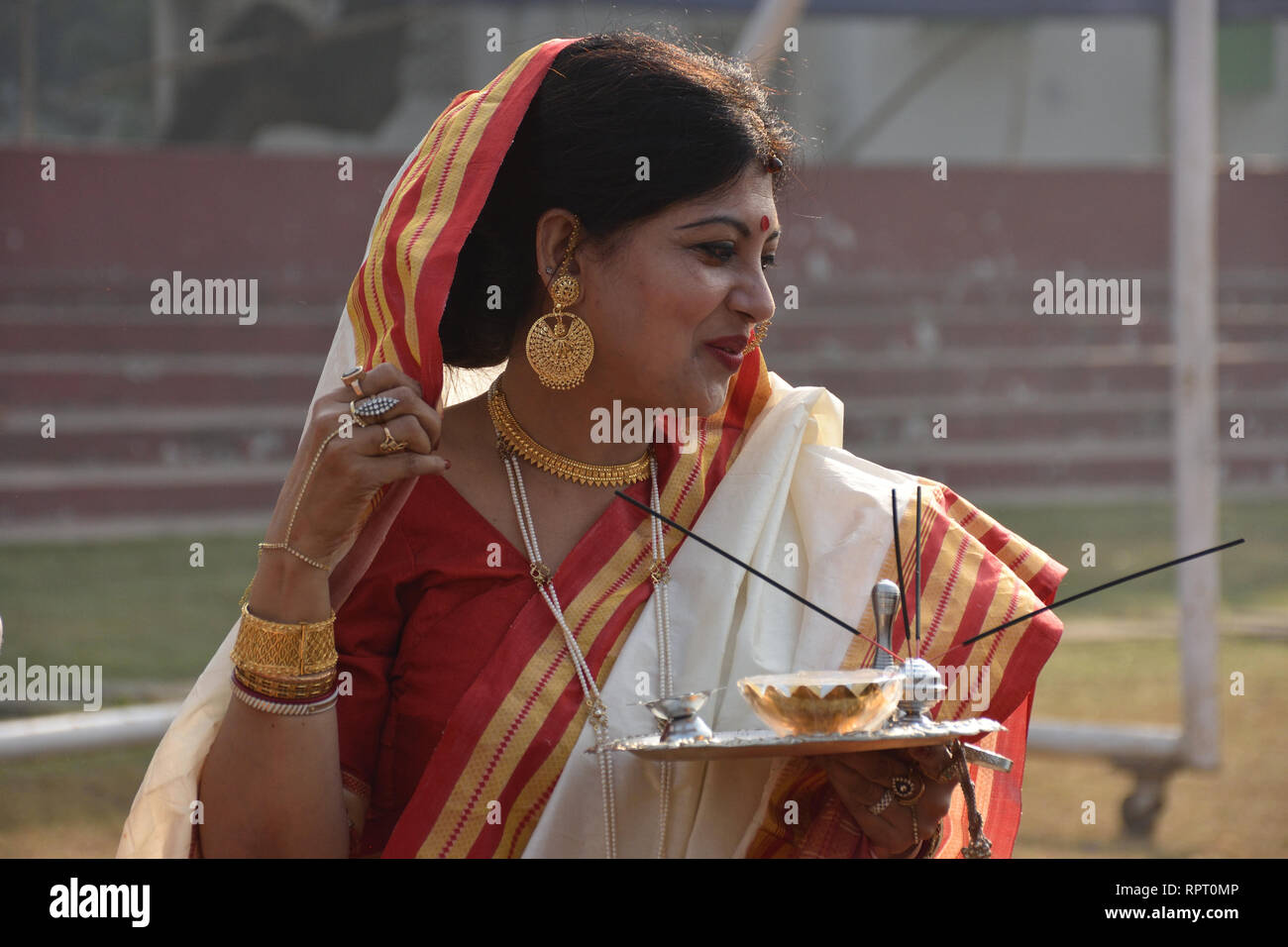 A Bengali Hindu lady poses as puja attitude with period costume and ...