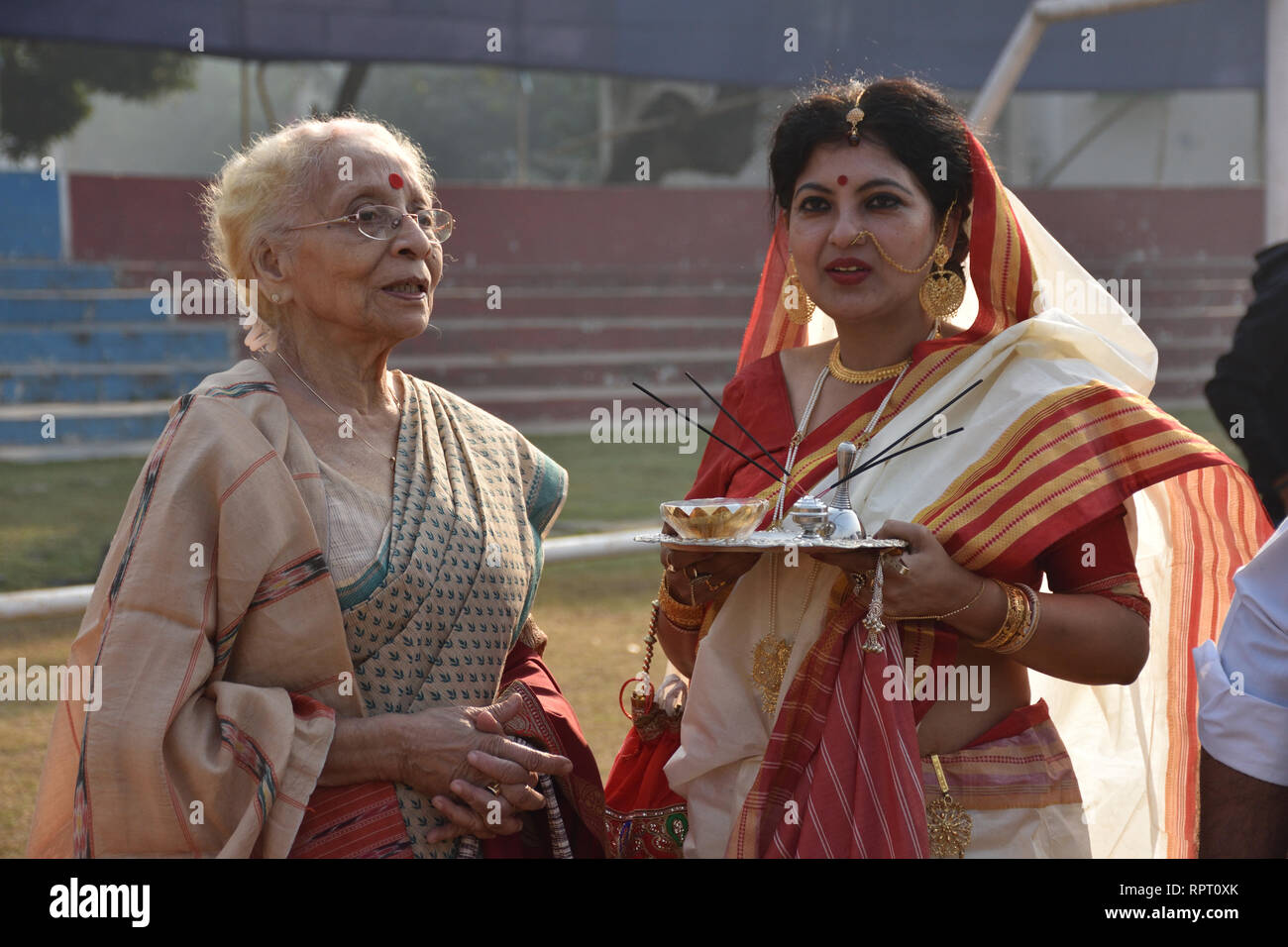 Bengali Hindu ladies poses as puja attitude with period costume and ...