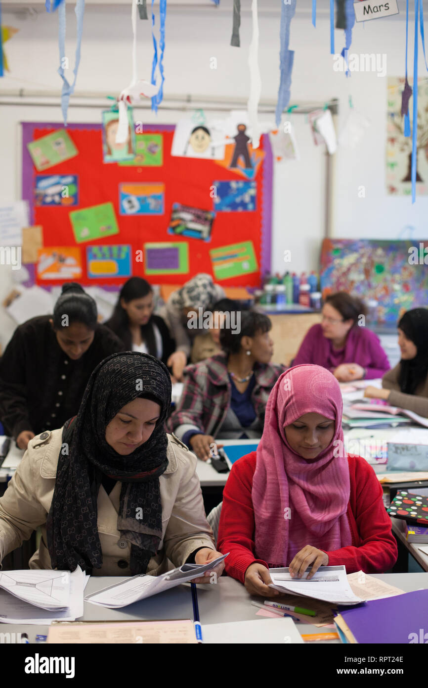 adults in a further education college studying childcare Stock Photo ...