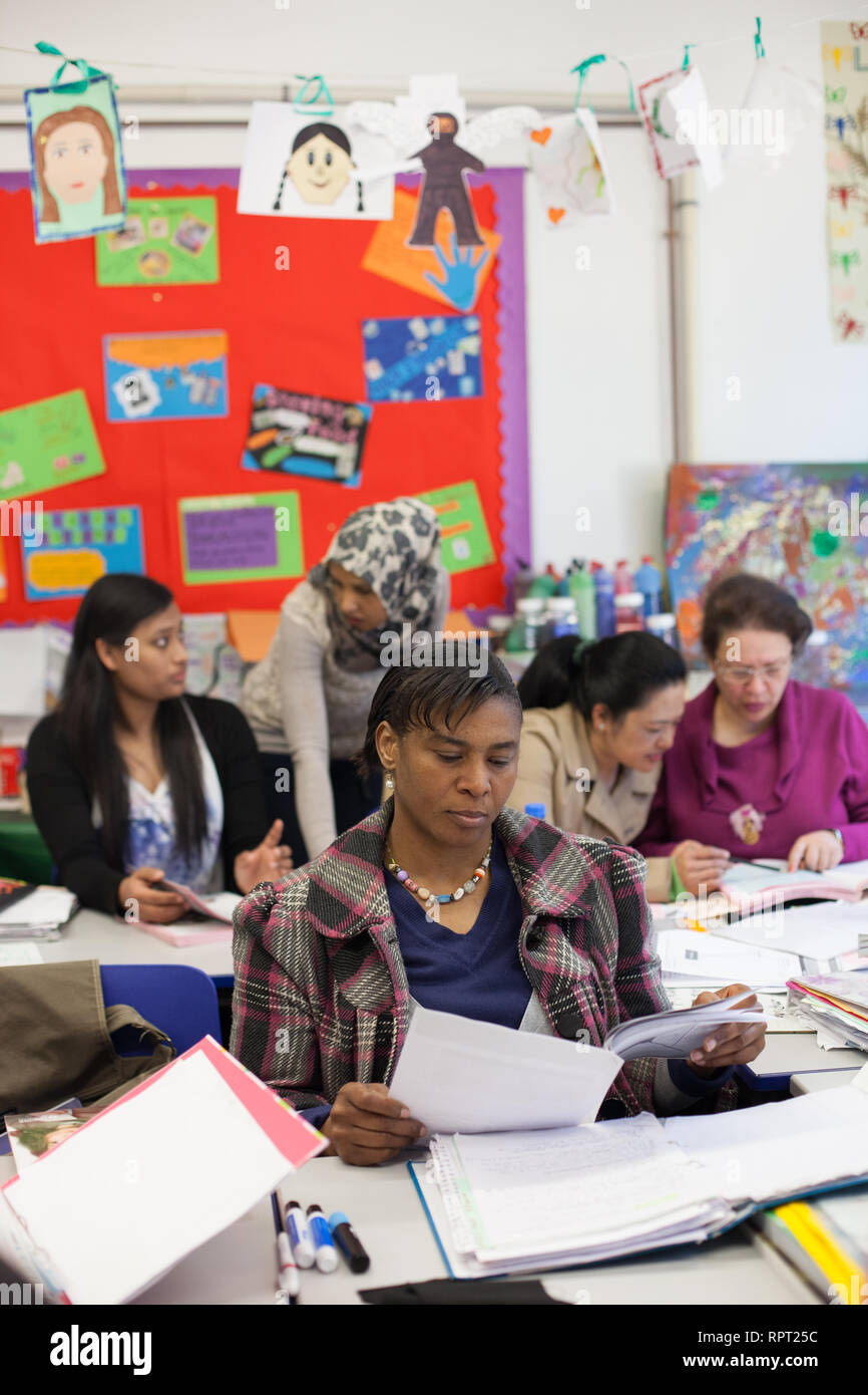 adults in a further education college studying childcare Stock Photo ...