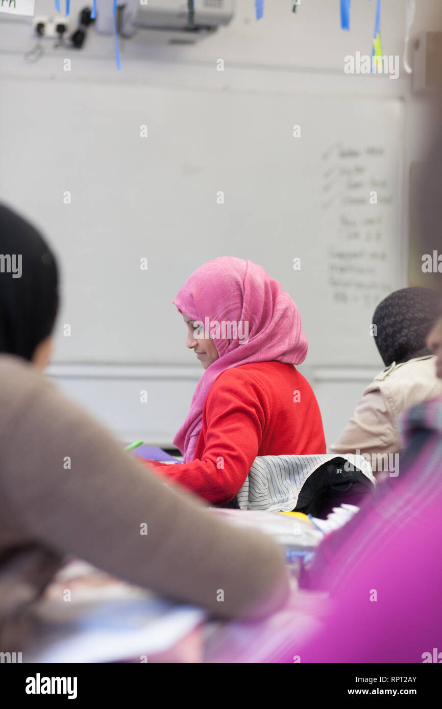 Adult teaching multi cultural hi-res stock photography and images - Alamy