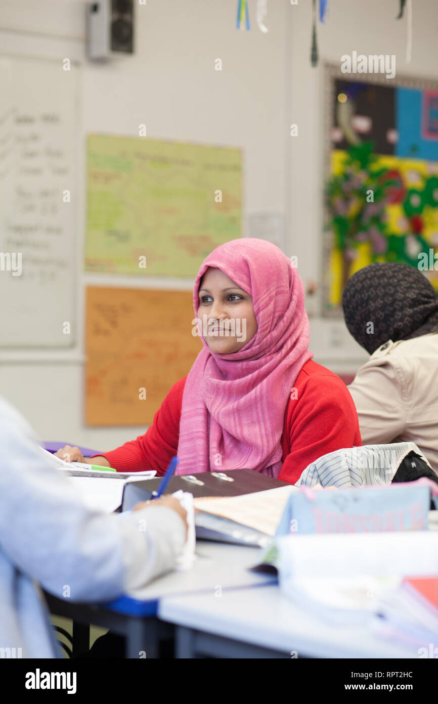 adults in a further education college studying childcare Stock Photo ...