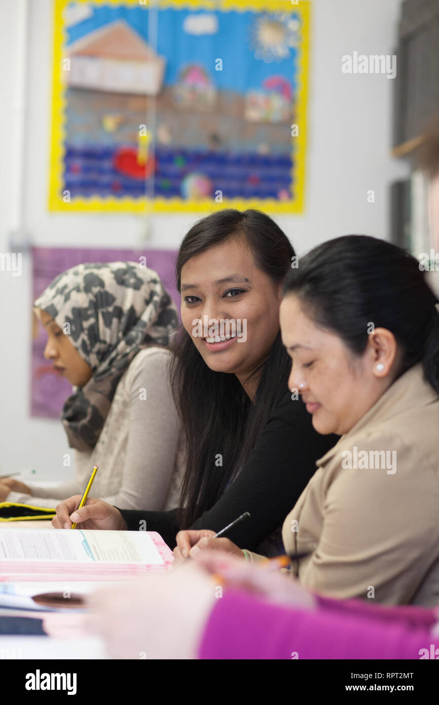 adults in a further education college studying childcare Stock Photo ...