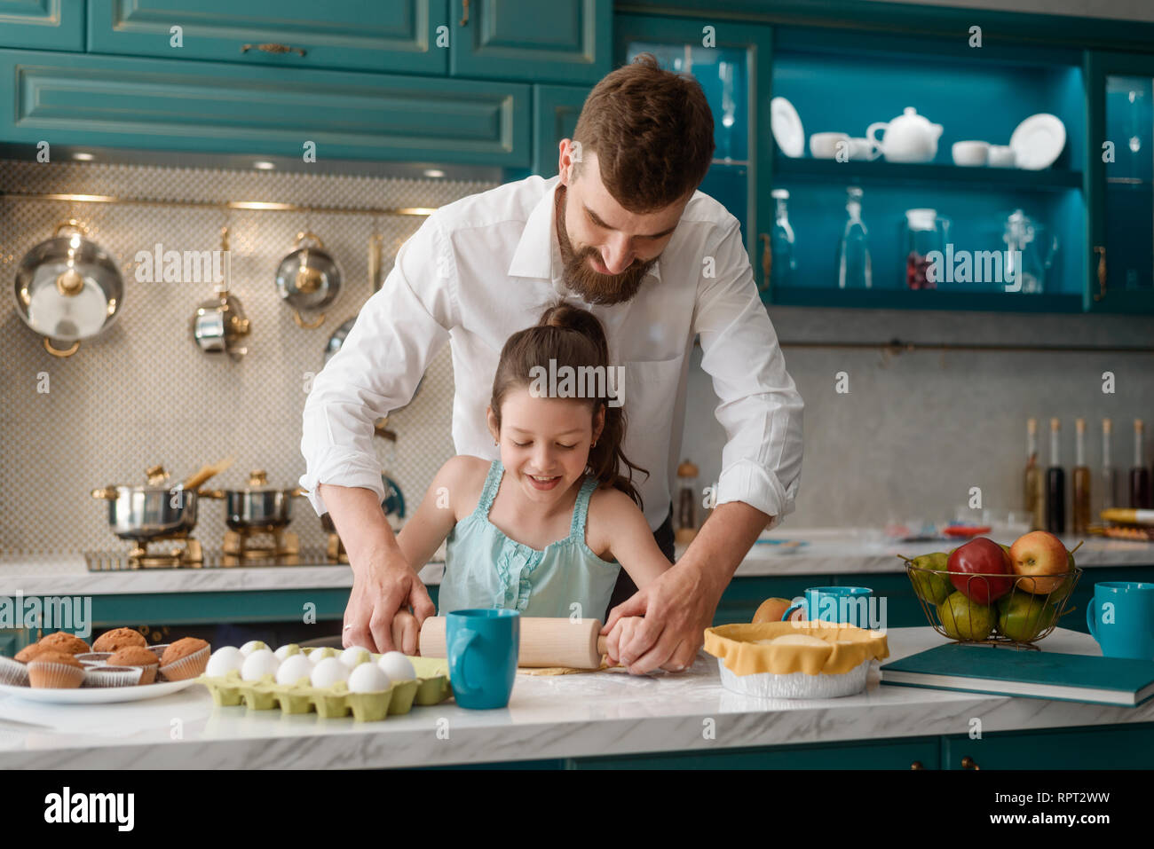 Father and daughter cooking together Stock Photo - Alamy