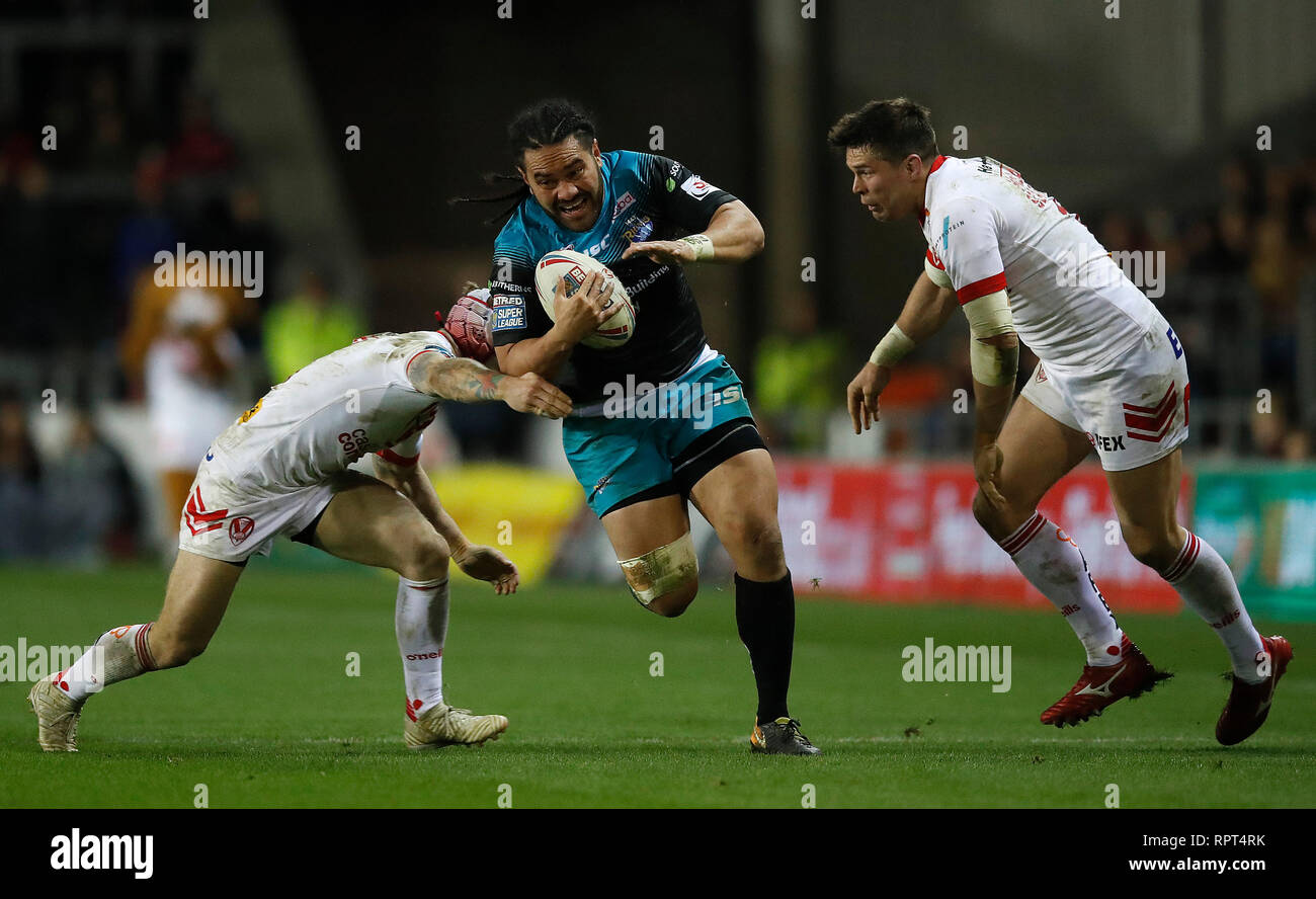 Leeds Rhinos' Konrad Hurrell is tackled by St Helens Saints' Theo Fages ...