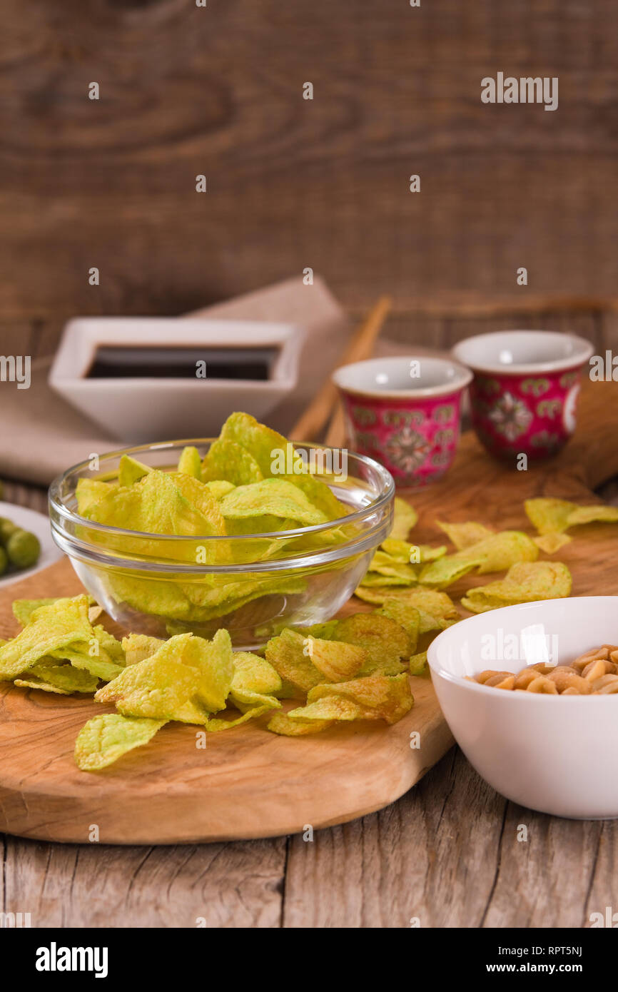 Wasabi flavour potato crisps Stock Photo - Alamy