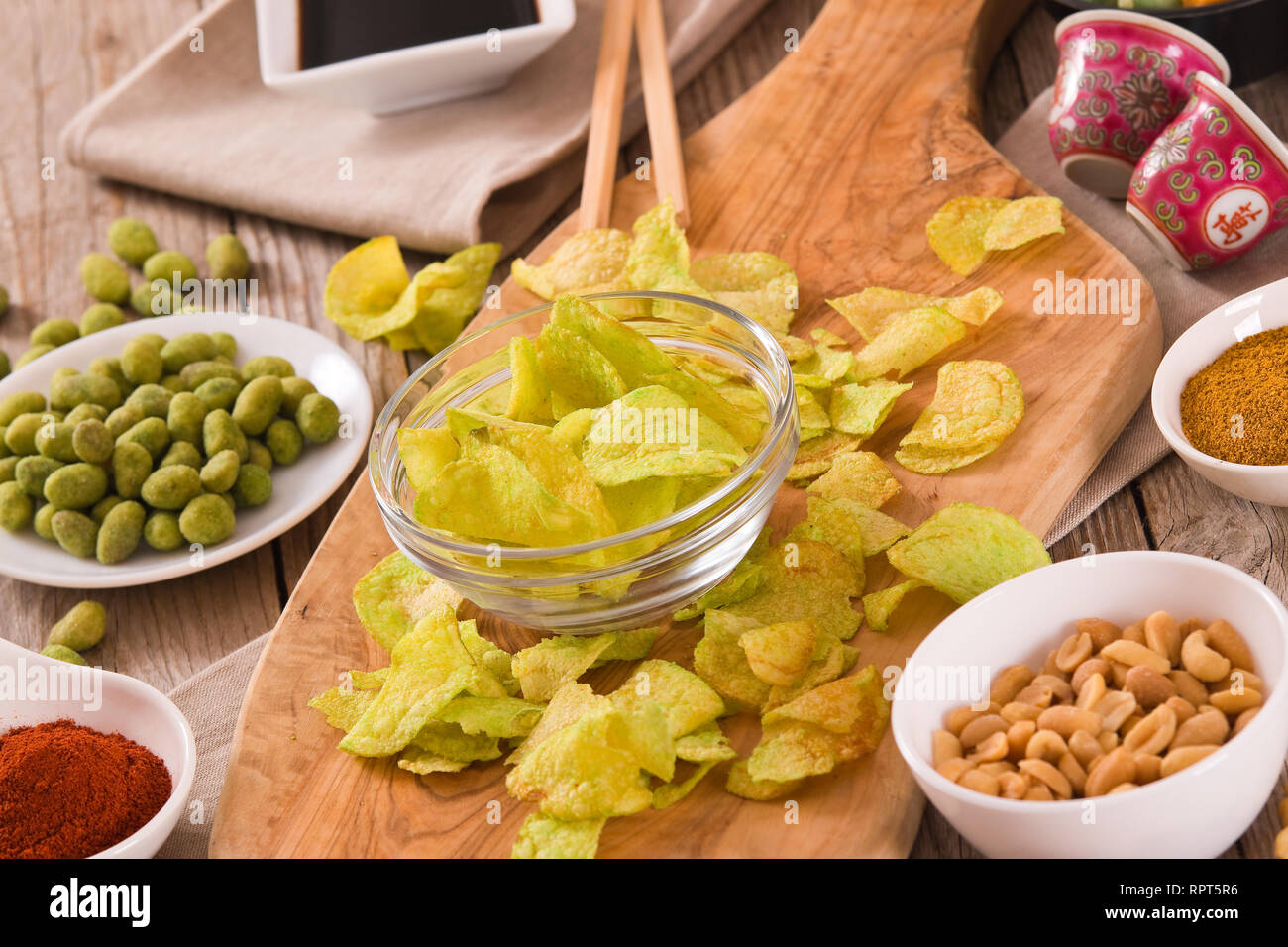 Wasabi flavour potato crisps Stock Photo - Alamy
