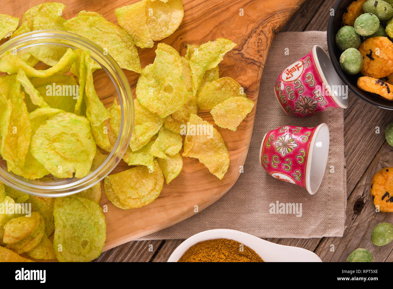 Wasabi flavour potato crisps Stock Photo - Alamy