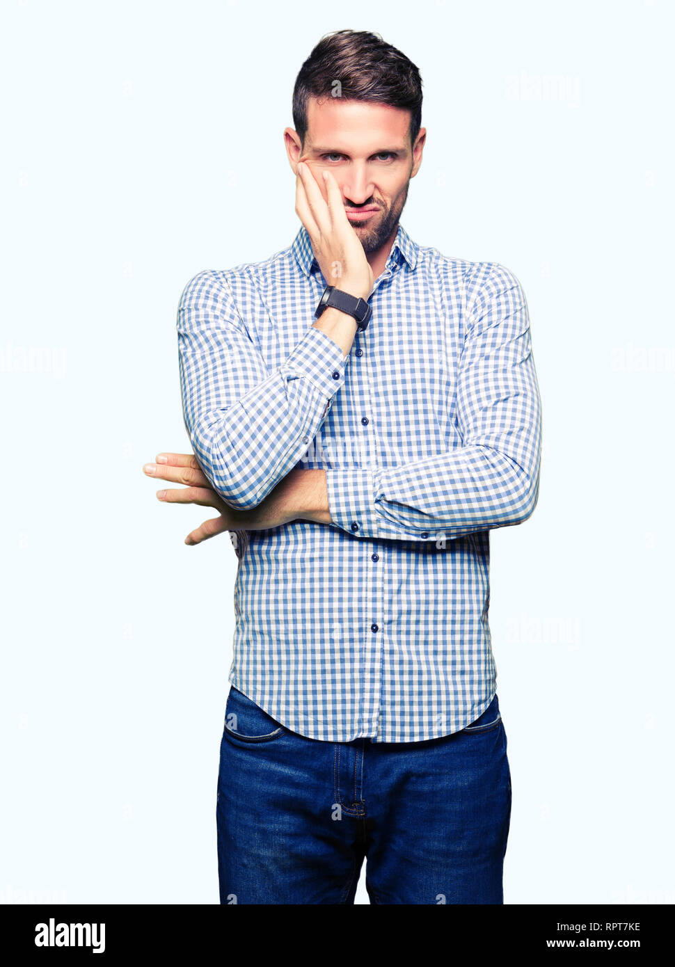 Handsome business man with blue eyes thinking looking tired and bored ...