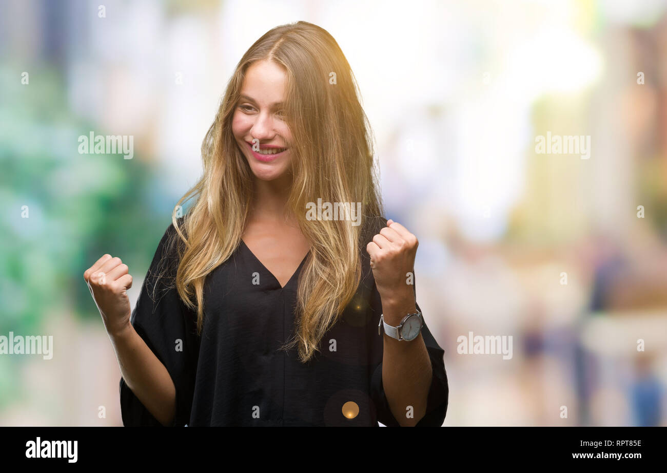 Young beautiful blonde woman over isolated background very happy and ...