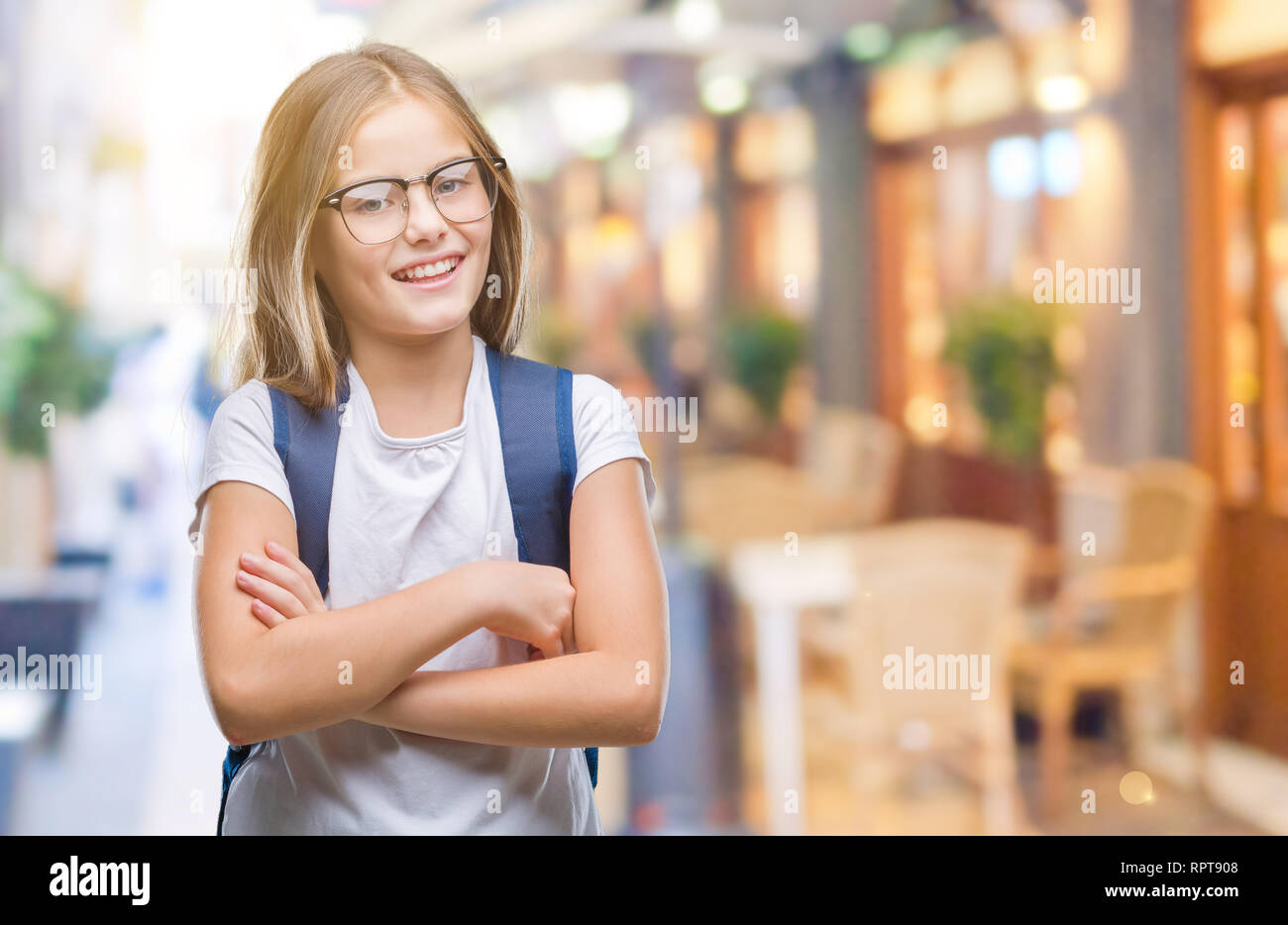 Young beautiful smart student girl wearing backpack over isolated ...