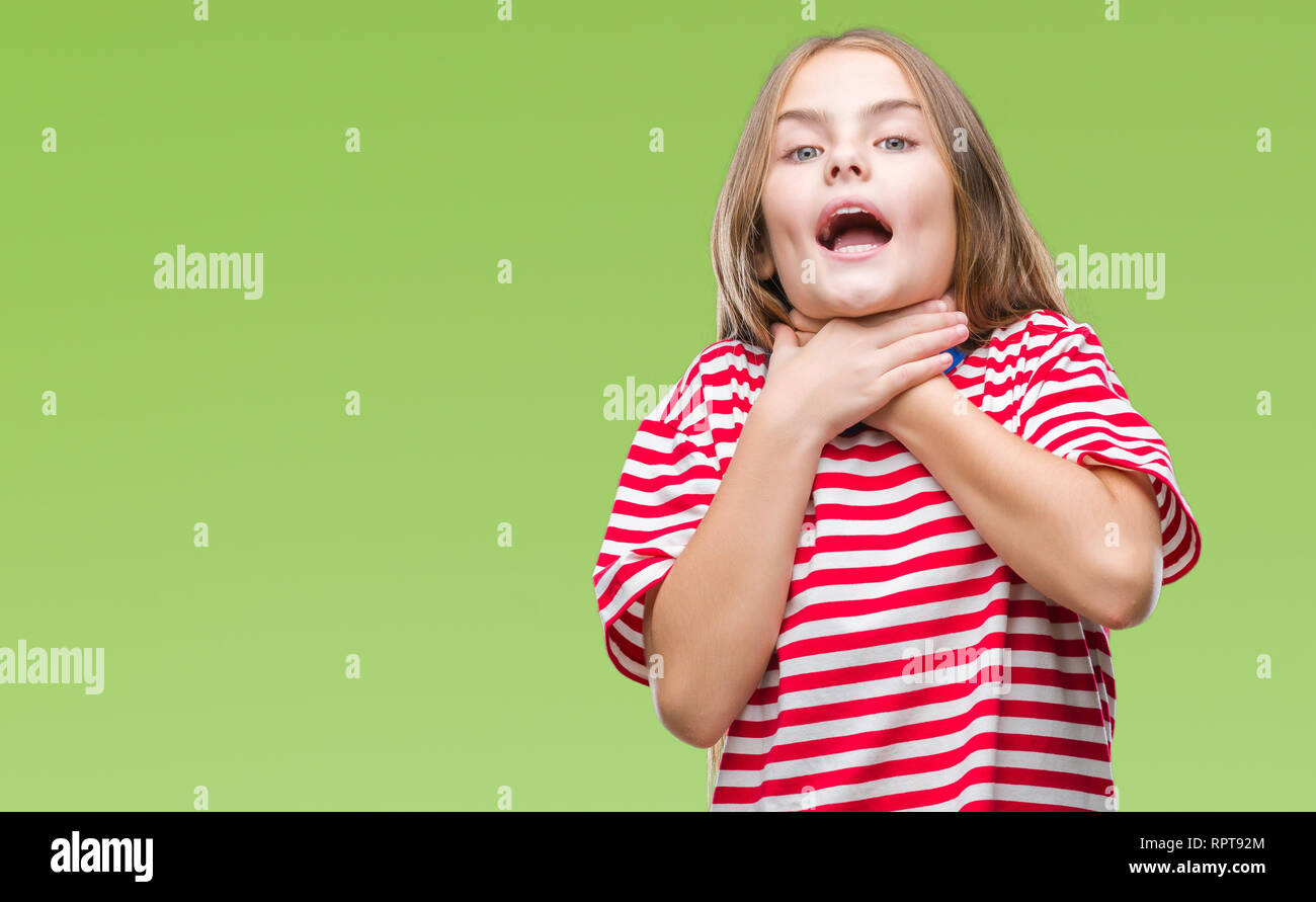 Young beautiful girl over isolated background shouting and suffocate ...