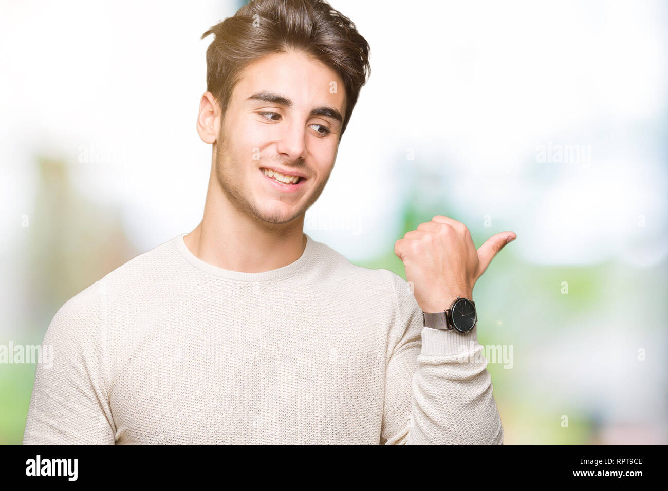 Young handsome man over isolated background smiling with happy face ...