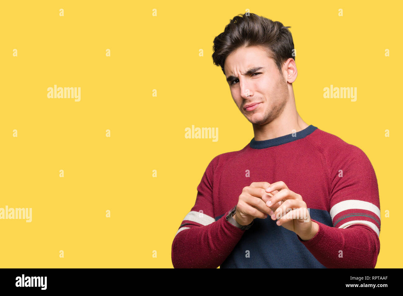 Young handsome man over isolated background disgusted expression ...