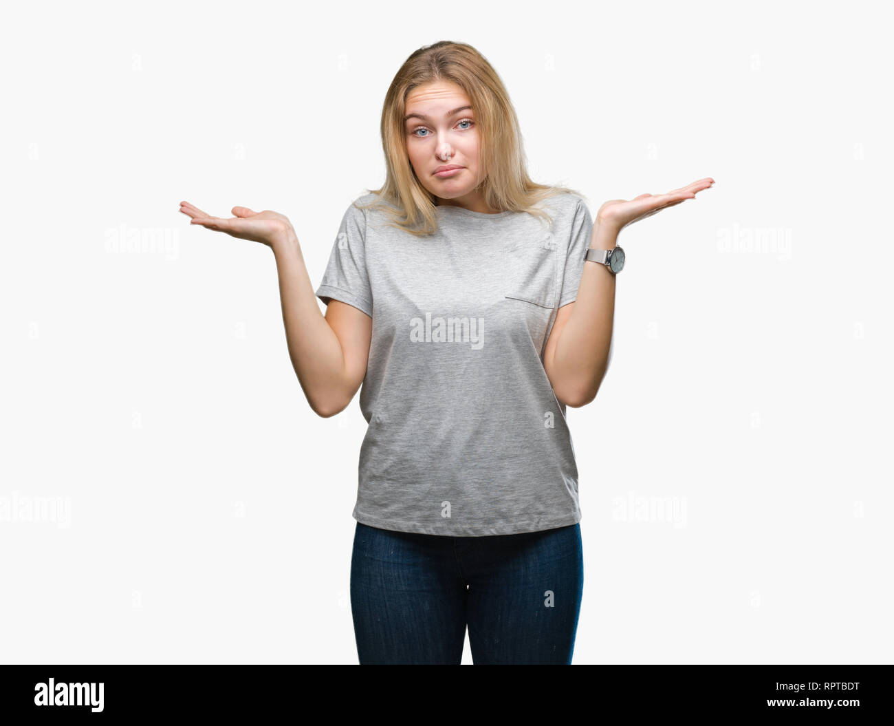 Young caucasian woman over isolated background clueless and confused ...