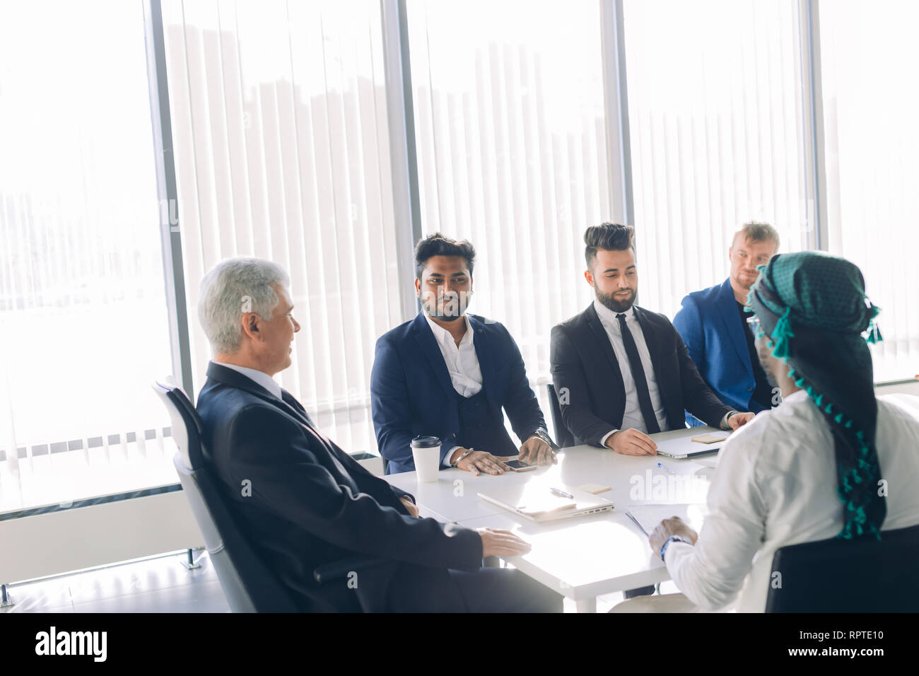 onstruction company management board members headed by grey-haired ...