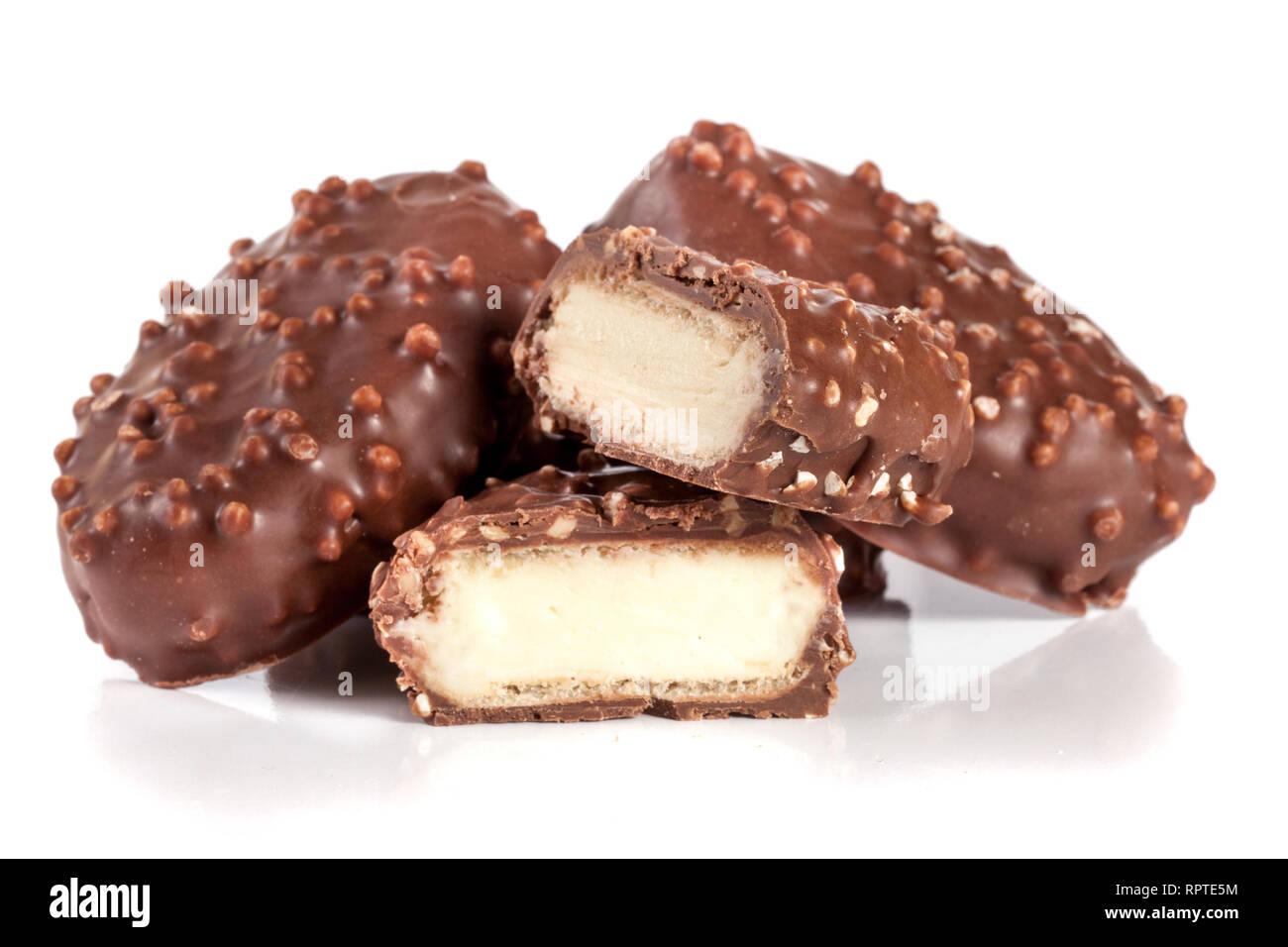 chocolate candy with white cream filling isolated on white background ...
