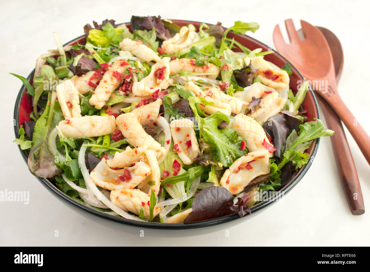 Delicious seafood salad squid onions hi-res stock photography and ...