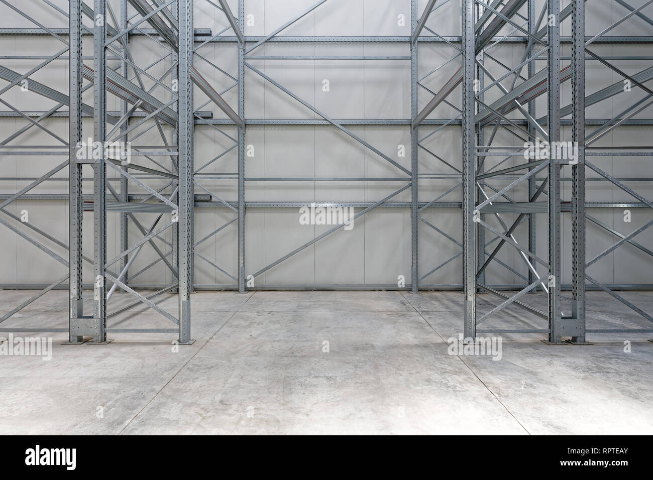 Empty Shelving Racks in New Distribution Warehouse Stock Photo - Alamy