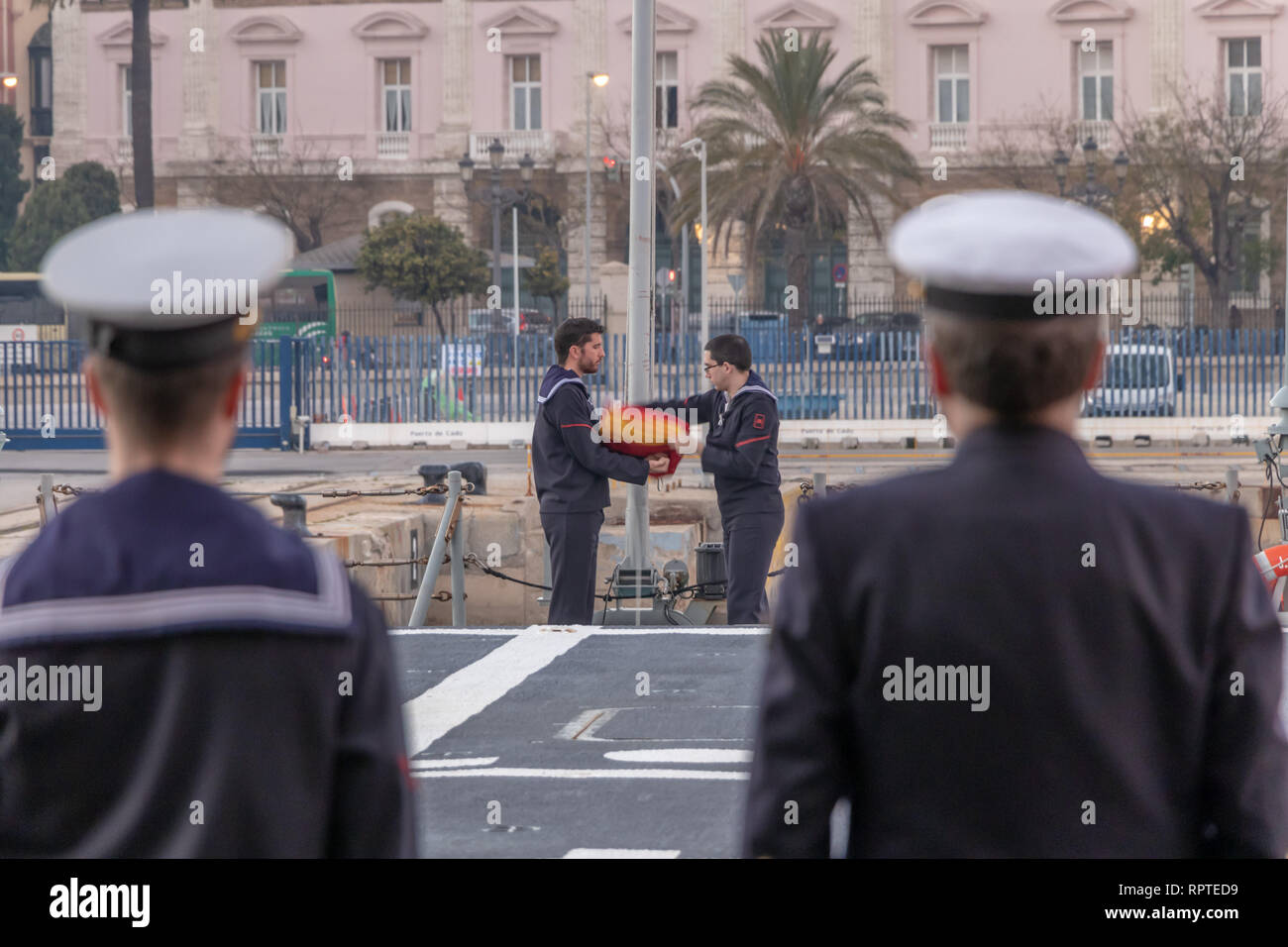 Performing the daily Flag Lowering Ceremony in spanish military ship ...