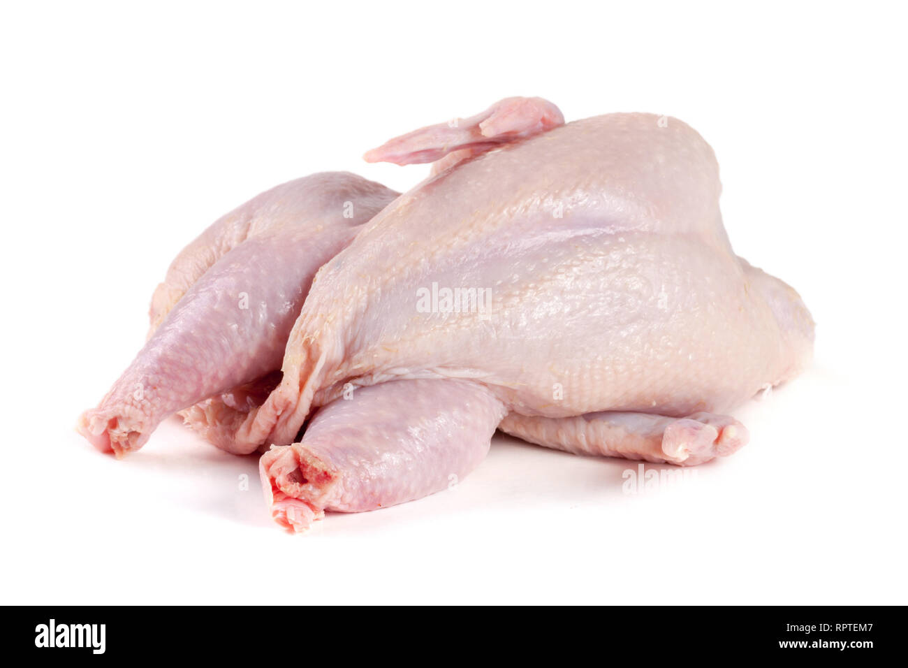 raw chicken carcass isolated on white background Stock Photo - Alamy
