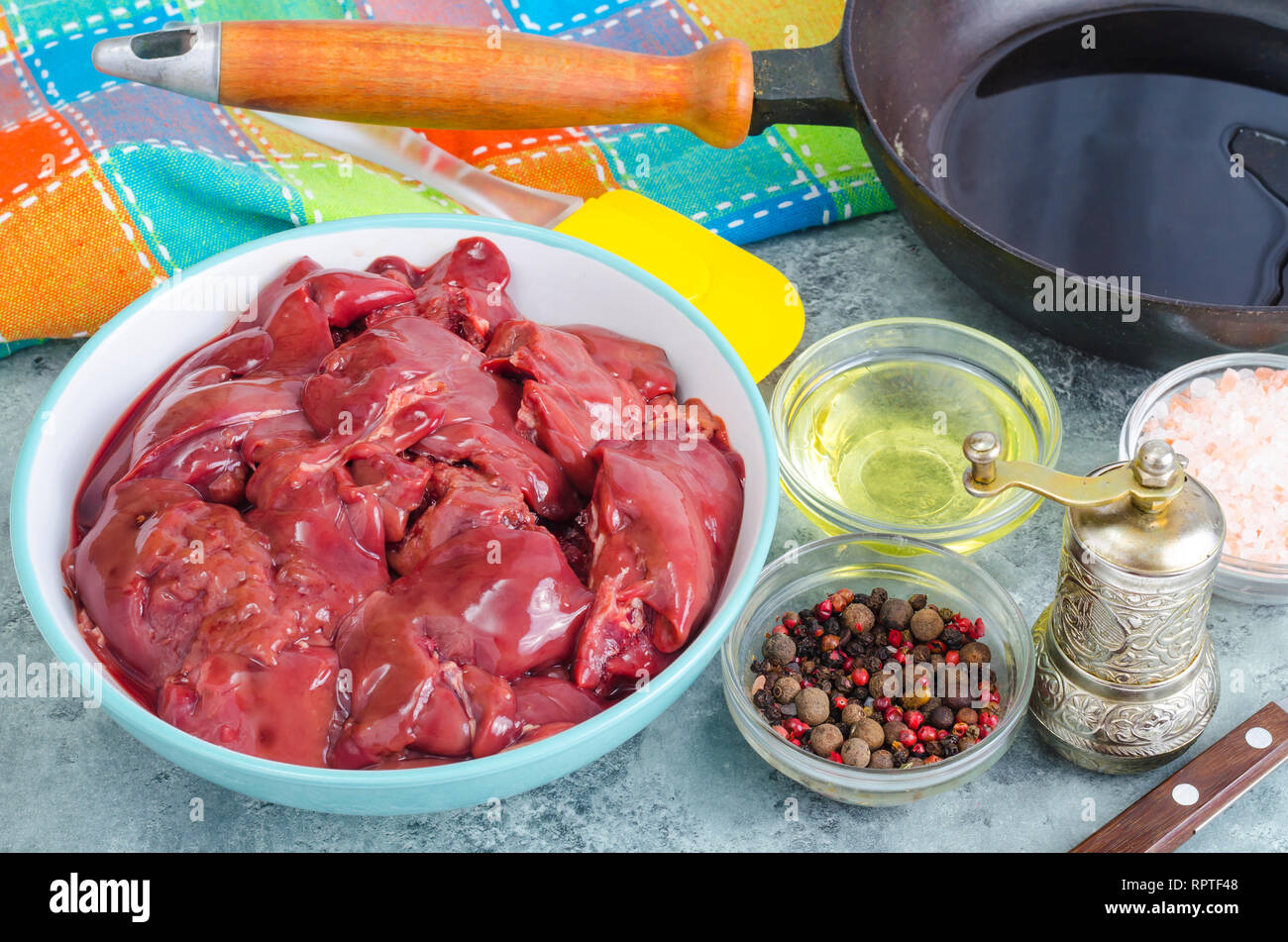 Raw chicken liver for cooking, spices, oil. Studio Photo Stock Photo ...