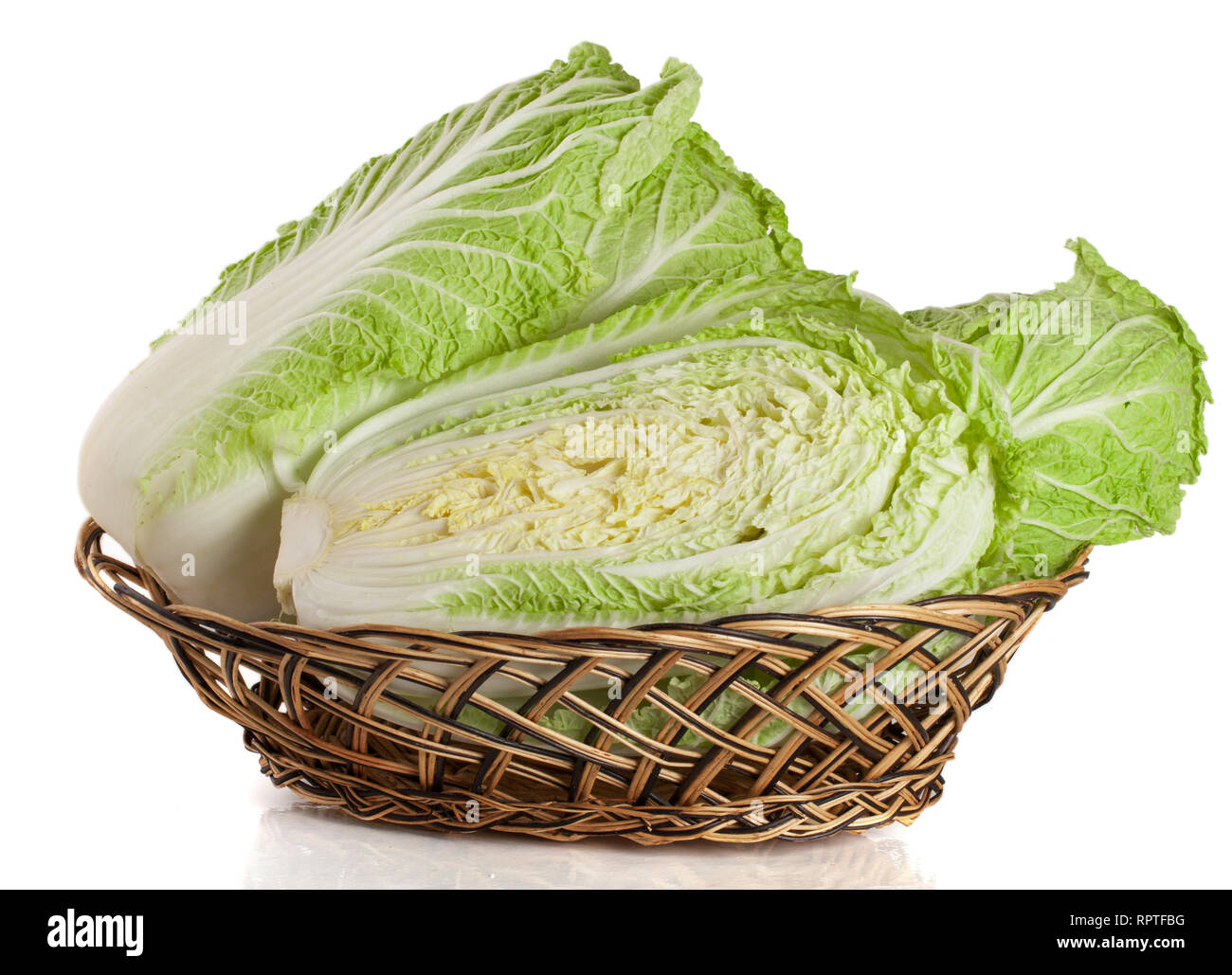 Chinese cabbage in a wicker basket isolated on white background Stock ...