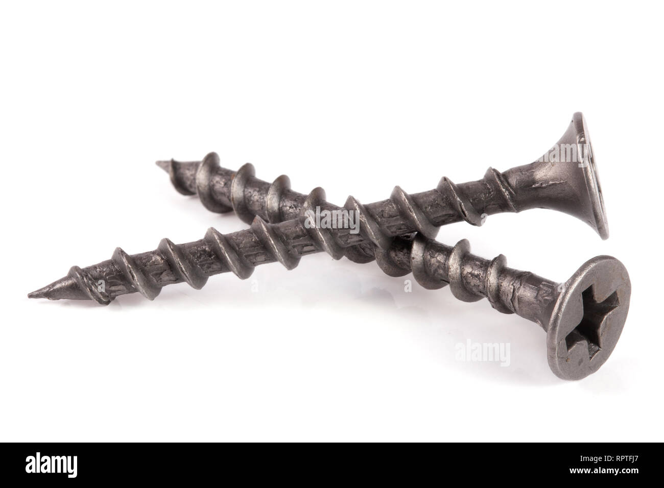 two metal screws isolated on white background Stock Photo - Alamy