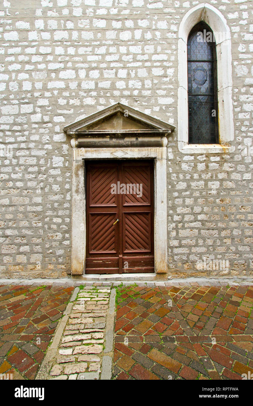 Double wooden door entrance to Catholic church Stock Photo - Alamy