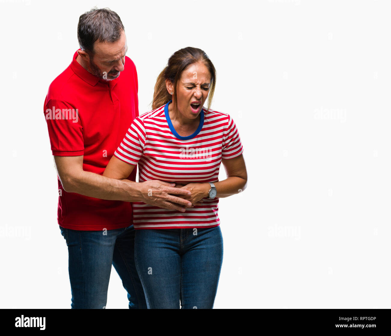 Middle age hispanic couple in love over isolated background with hand ...