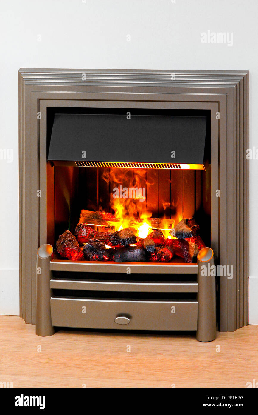 Romantic atmosphere in front of modern fireplace Stock Photo - Alamy