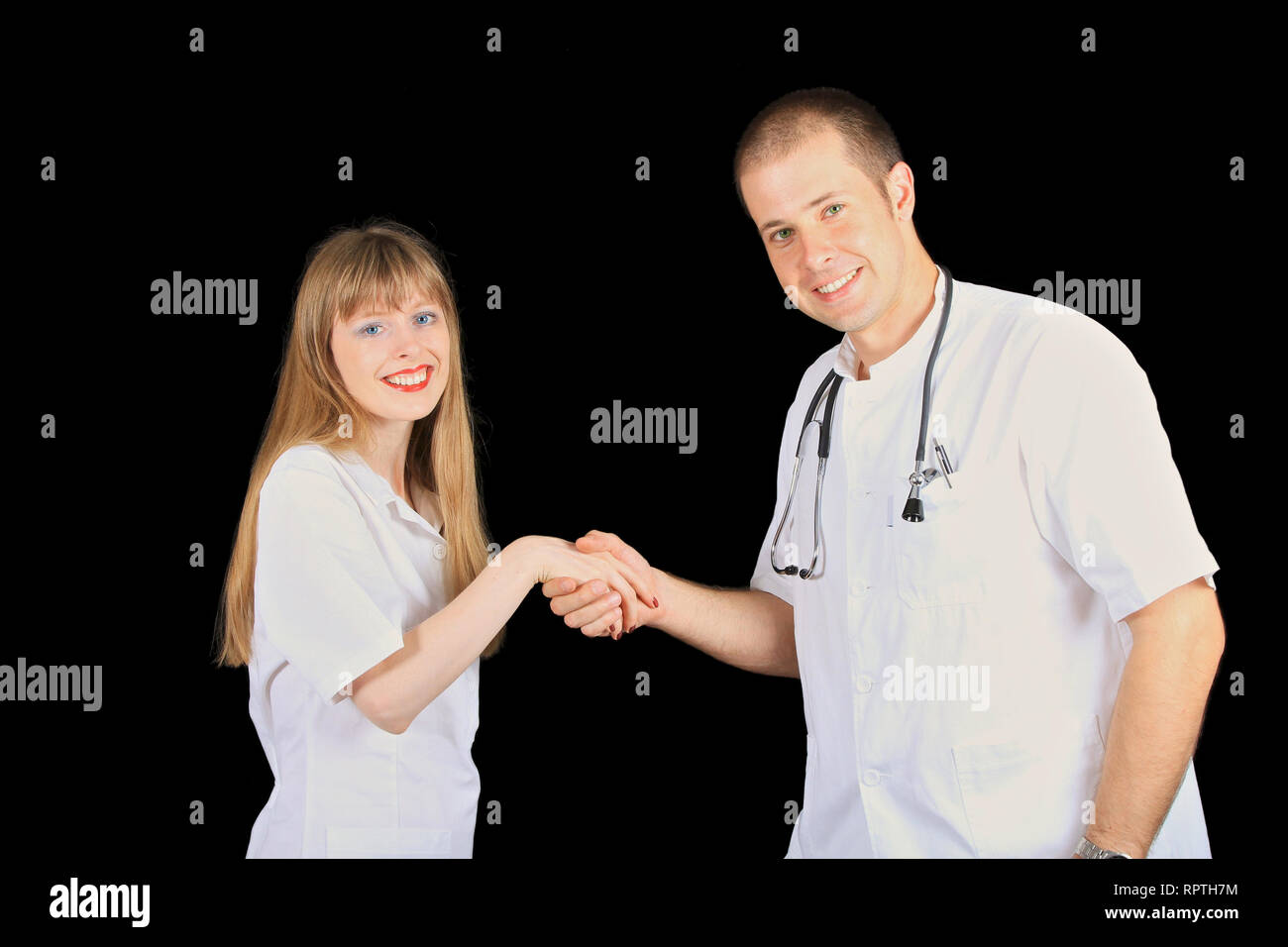 Shaking hands health workers hi-res stock photography and images - Alamy