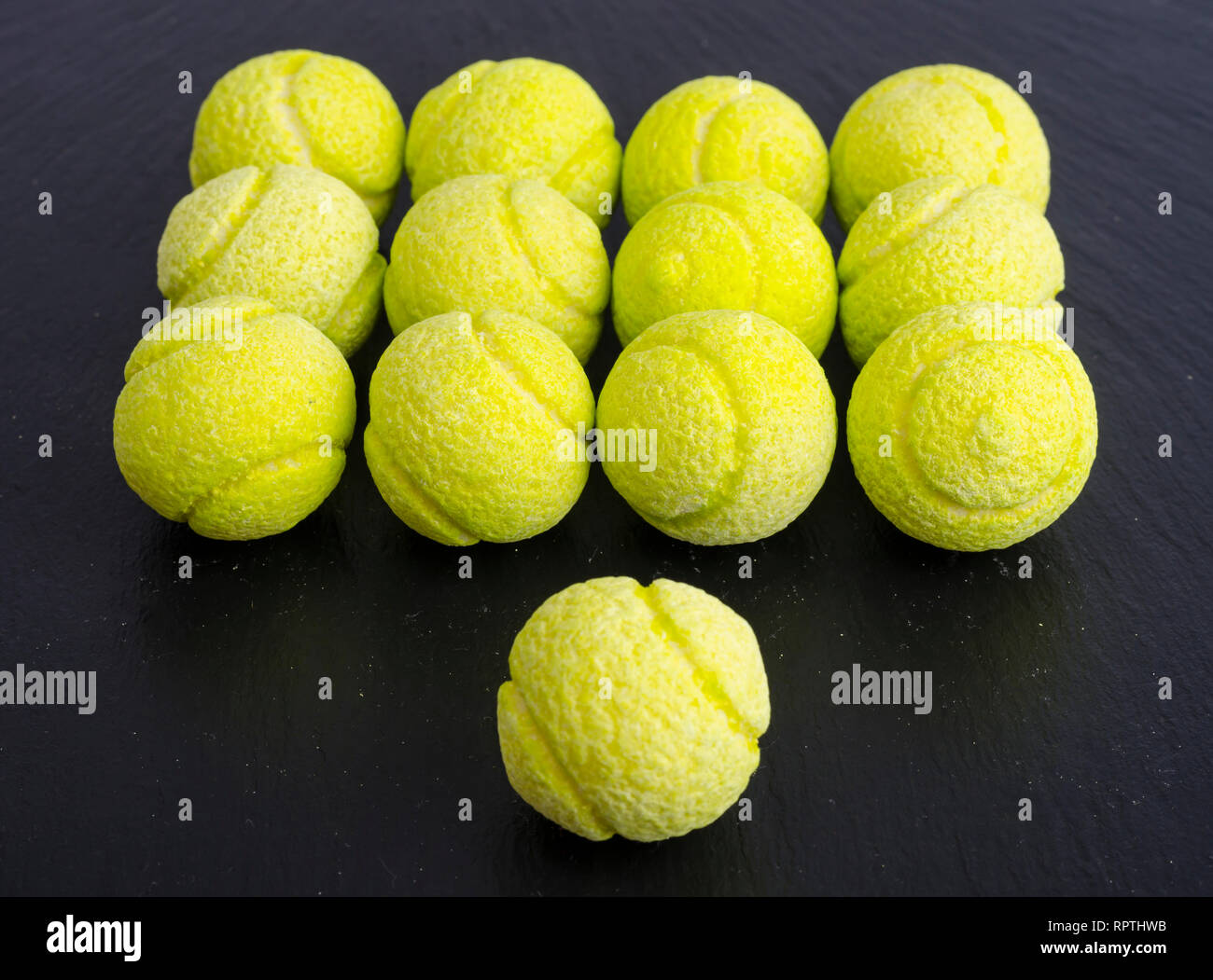 Round balls of chewing candies on black background. Studio Photo Stock ...