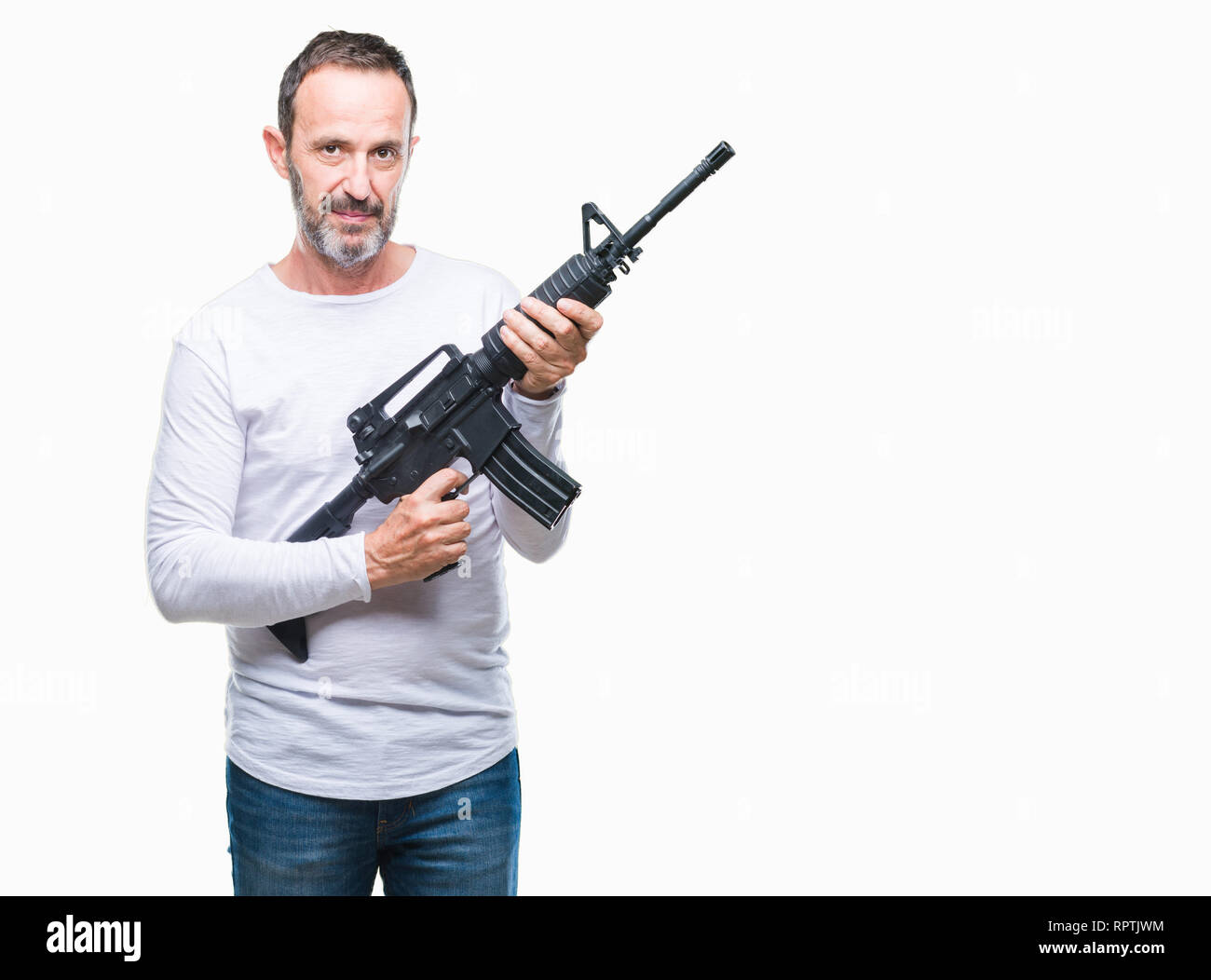 Middle age senior hoary criminal man holding gun weapon over isolated ...
