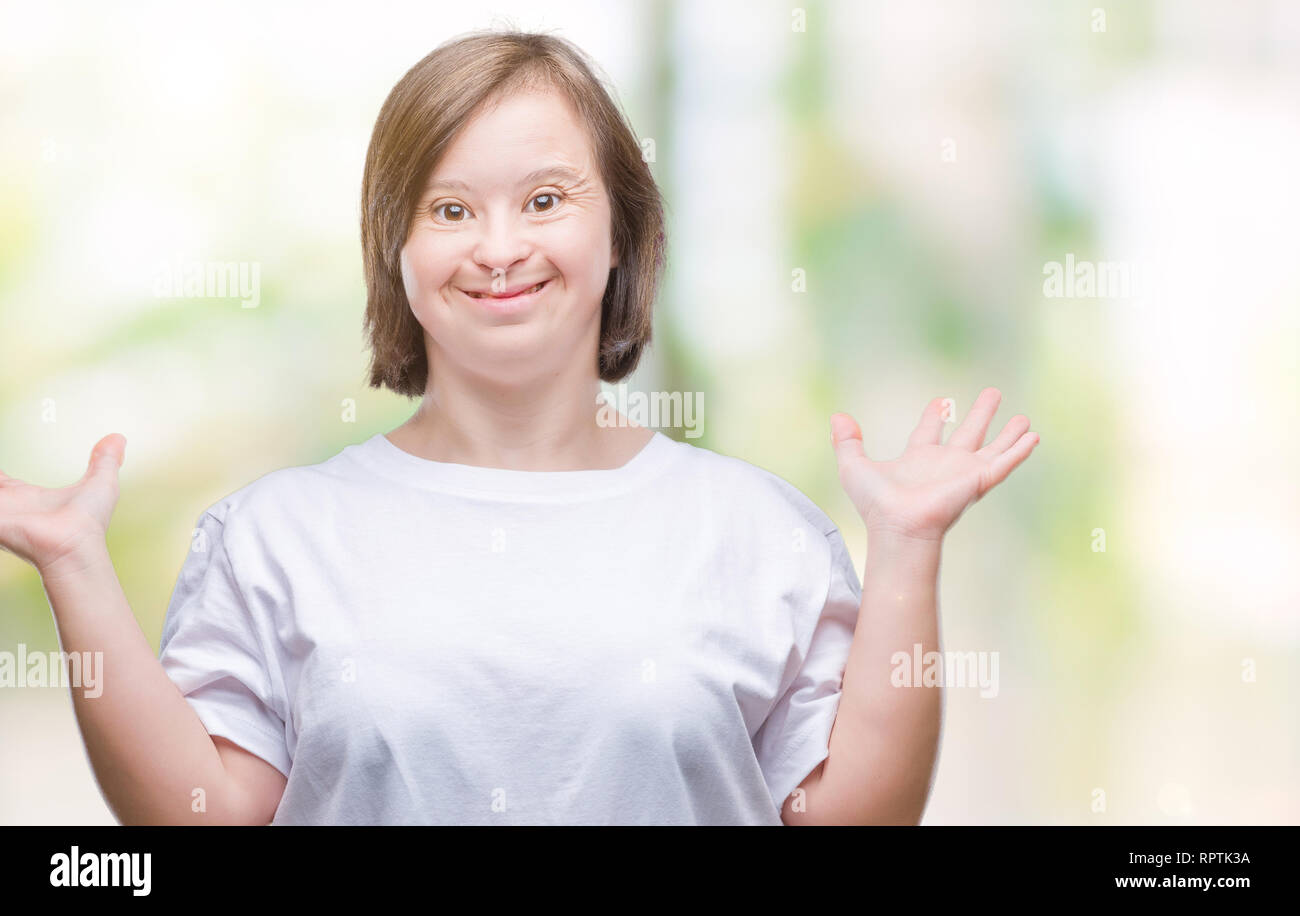 Young adult woman with down syndrome over isolated background ...