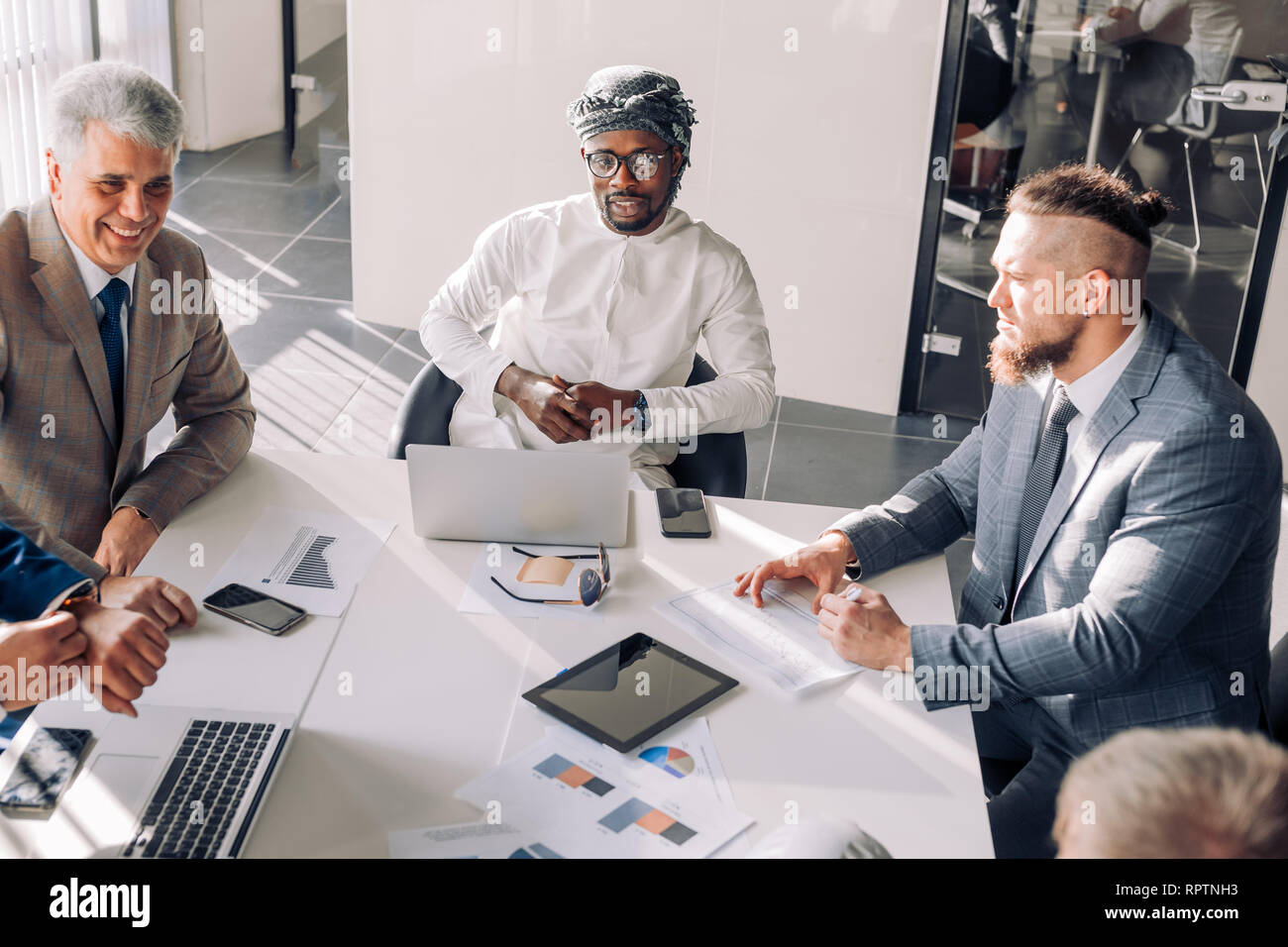 Close up top view of confident business men of different race and ages ...