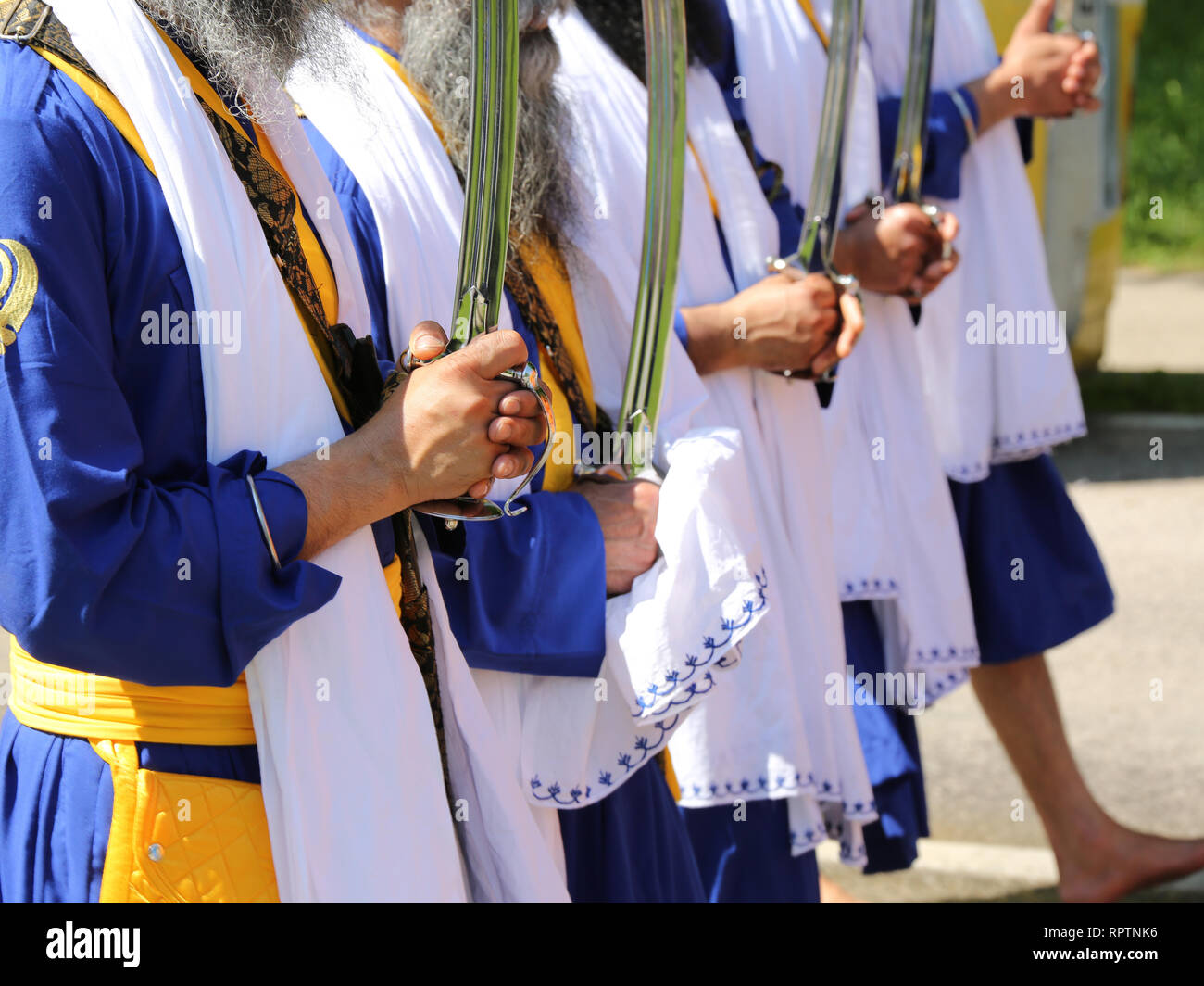 Sikh men swords hi-res stock photography and images - Alamy