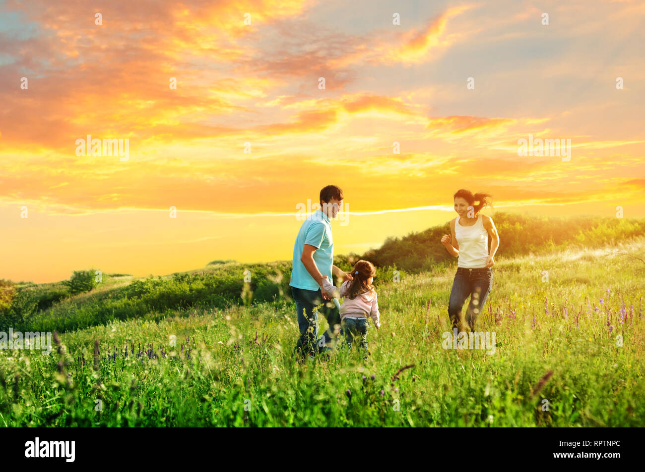 happy family enjoying the life together outdoors Stock Photo - Alamy