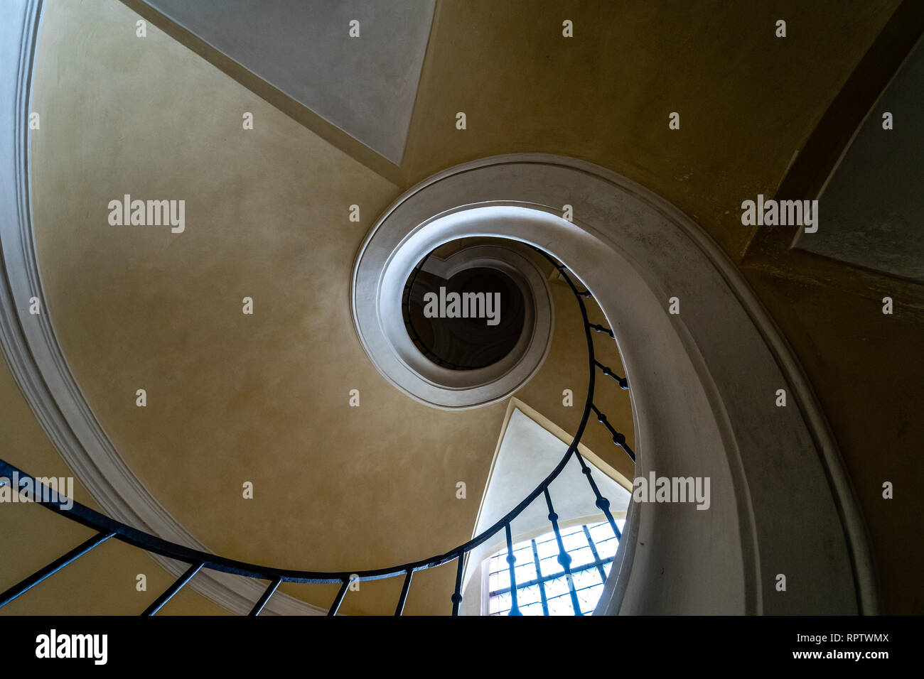 Old spiral staircase. Bottom view Stock Photo - Alamy