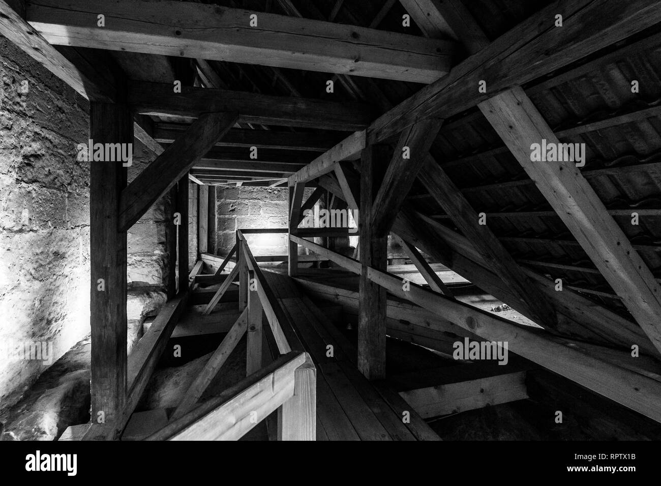 Wooden structures (rafters and beams) of the attic of an old house ...