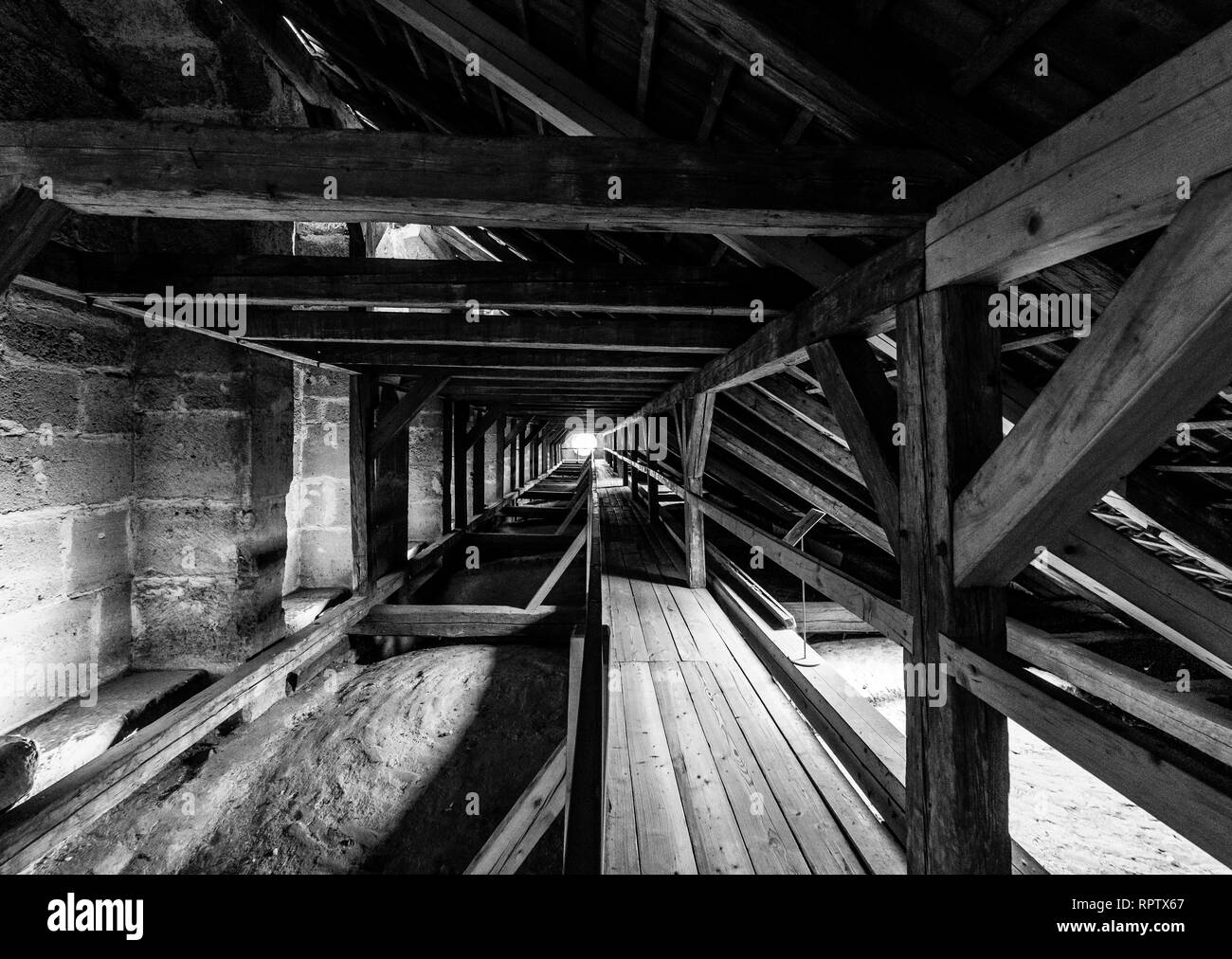 Wooden structures (rafters and beams) of the attic of an old house ...