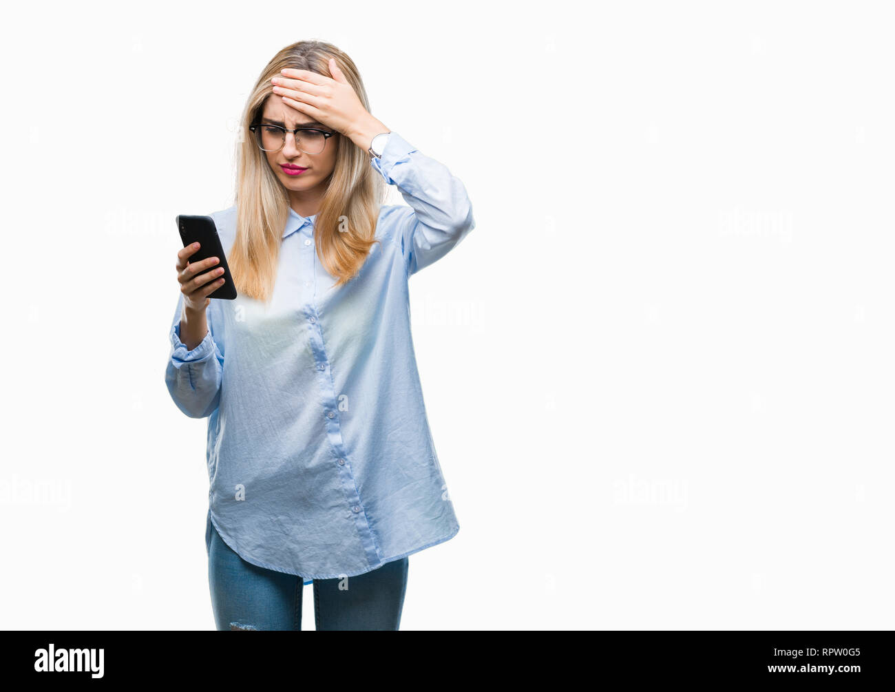 Young beautiful blonde business woman using smartphone over isolated ...