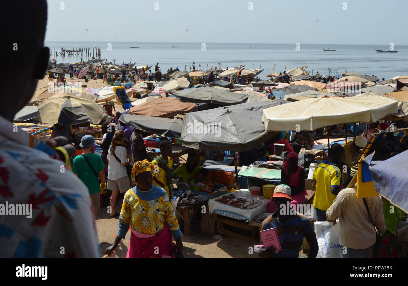 Crowded fish market in Mbour (Senegal) extending into the beach Stock ...