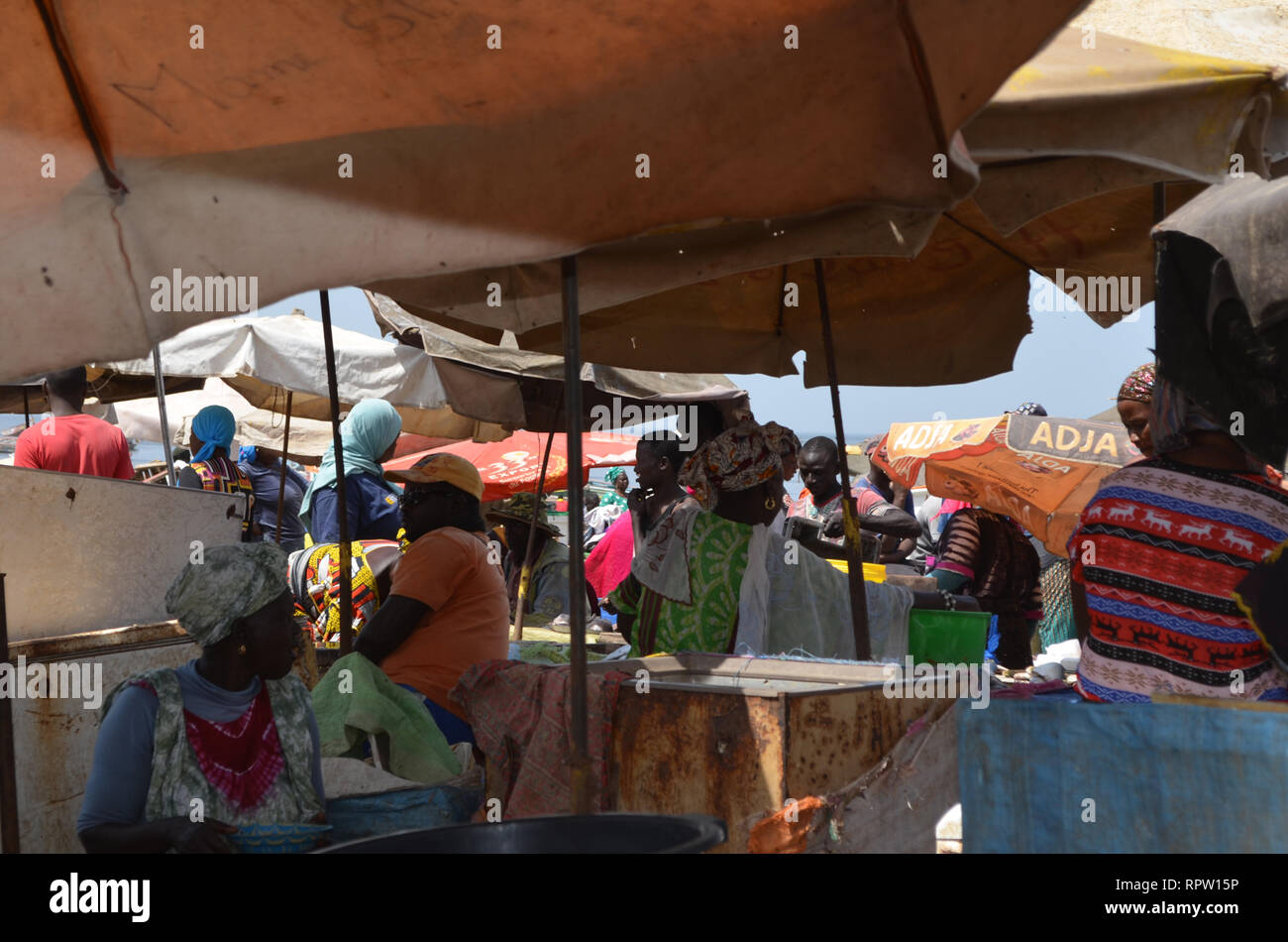 Crowded fish market in Mbour (Senegal) extending into the beach Stock ...