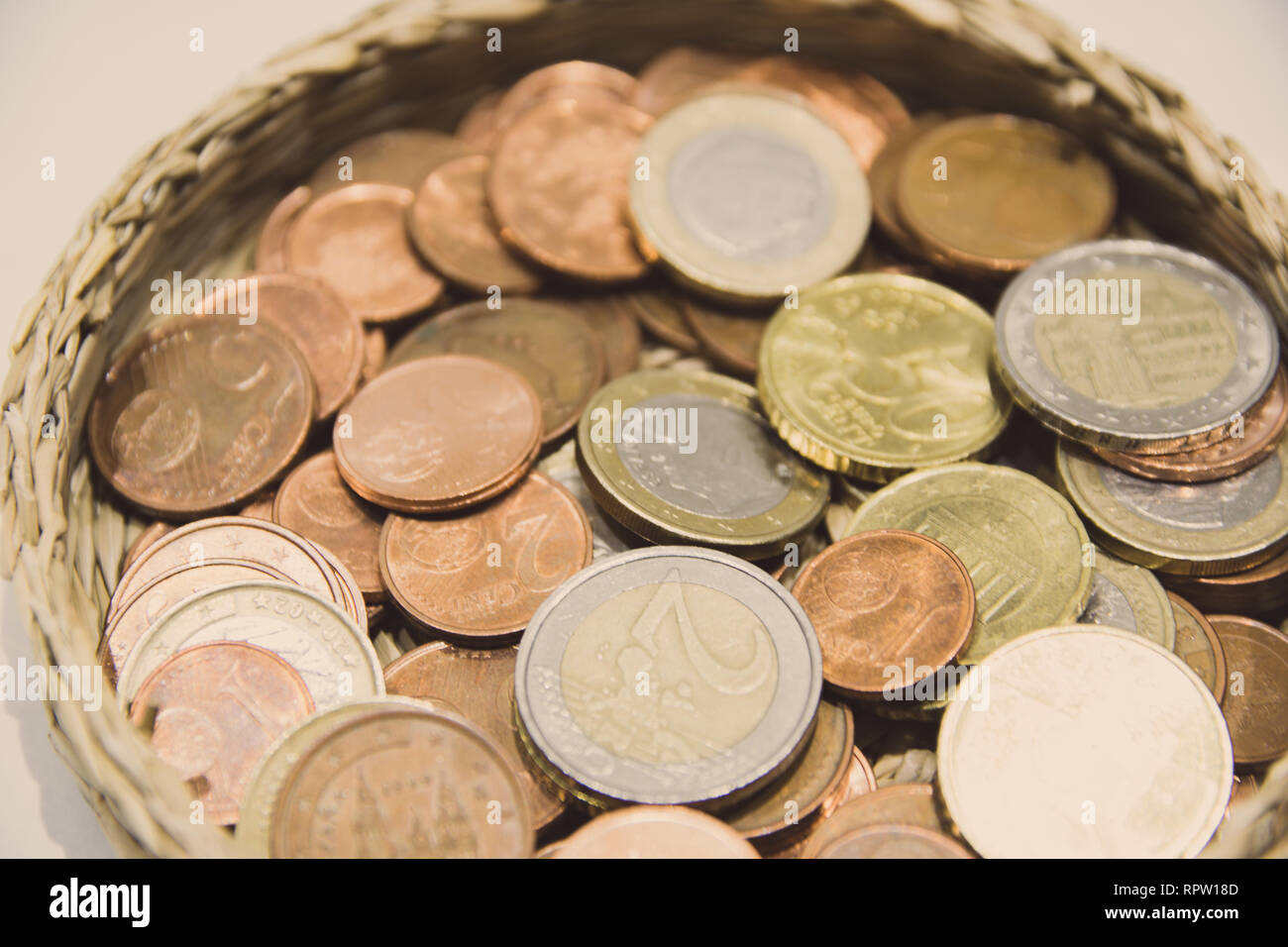 Basket full of euro coins. European Union currency Money background ...