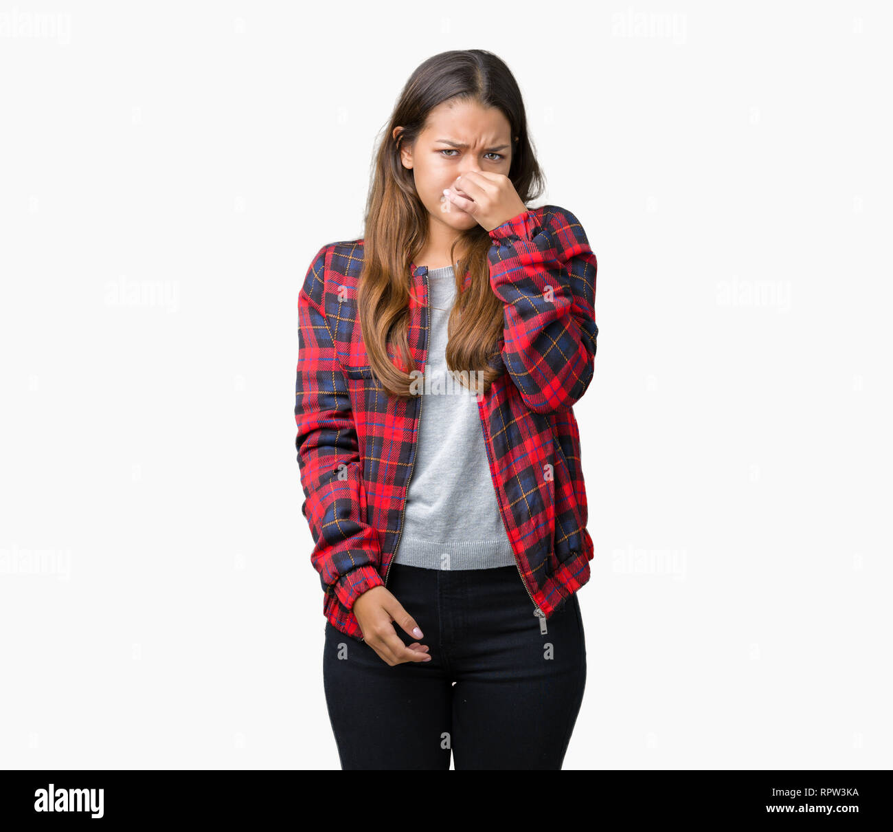 Young beautiful brunette woman wearing a jacket over isolated ...