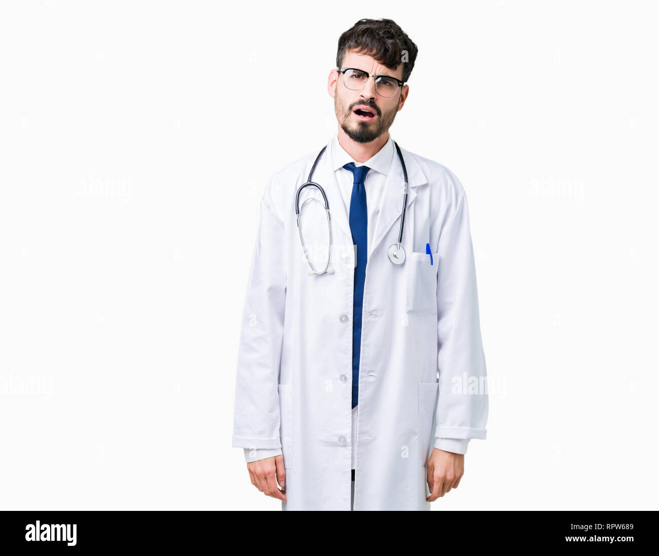 Young doctor man wearing hospital coat over isolated background In ...