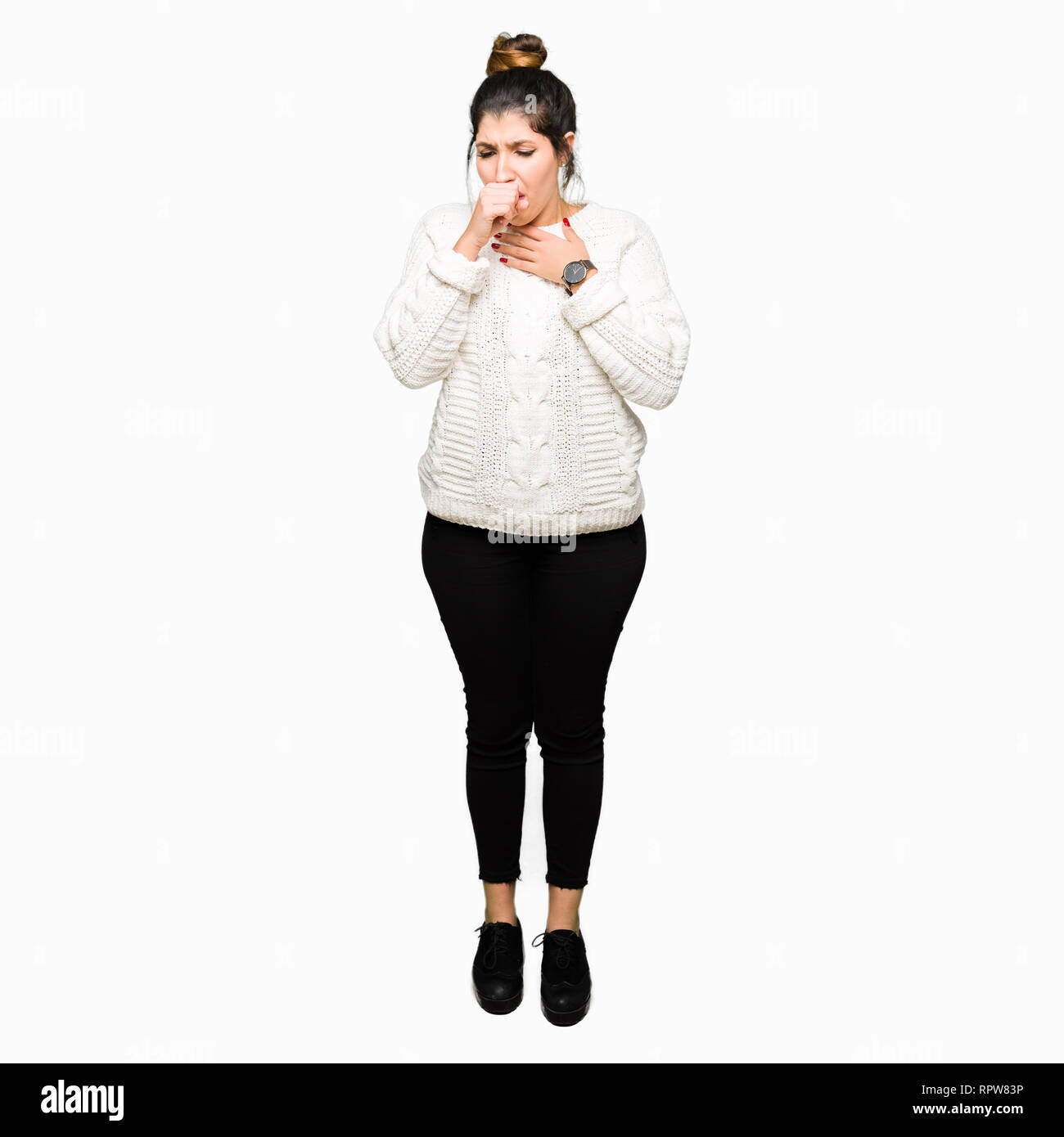 Young beautiful woman wearing winter sweater feeling unwell and ...