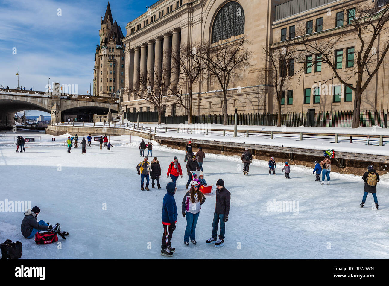 People celebrate the Winterlude festival on the frozen Rideau Canal ...